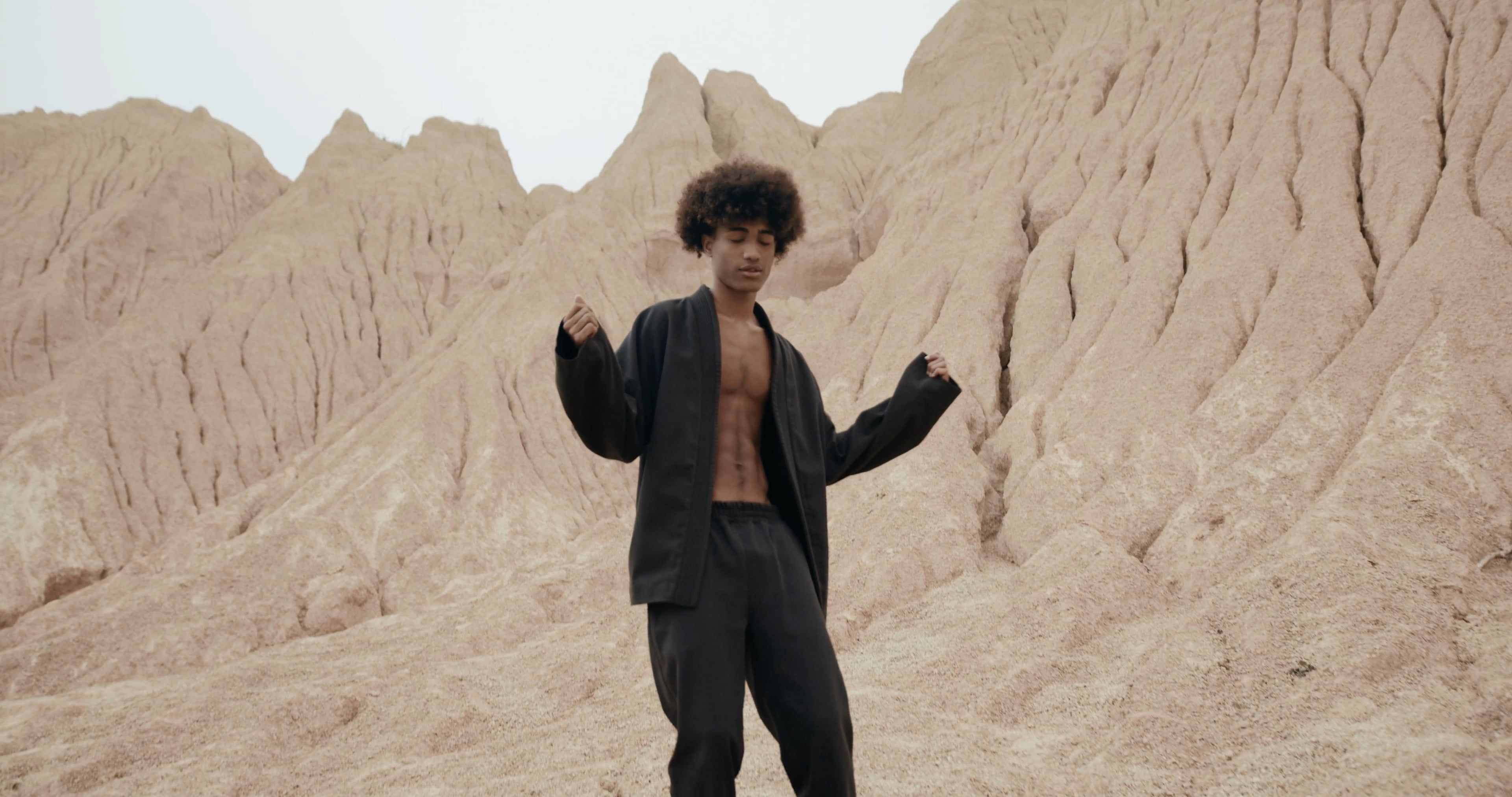 Man Dancing in the Desert Wearing Kimono · Free Stock Video