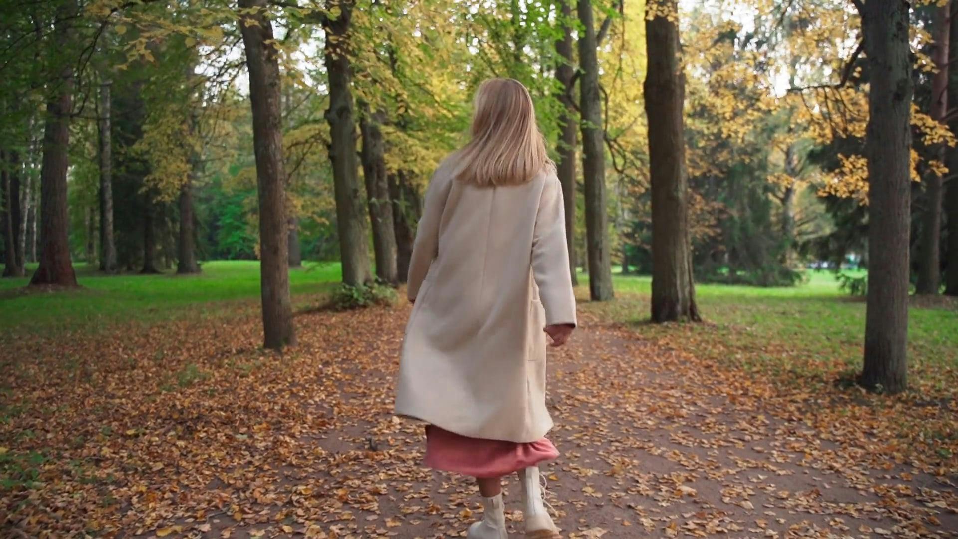 A Woman Spinning while Walking · Free Stock Video