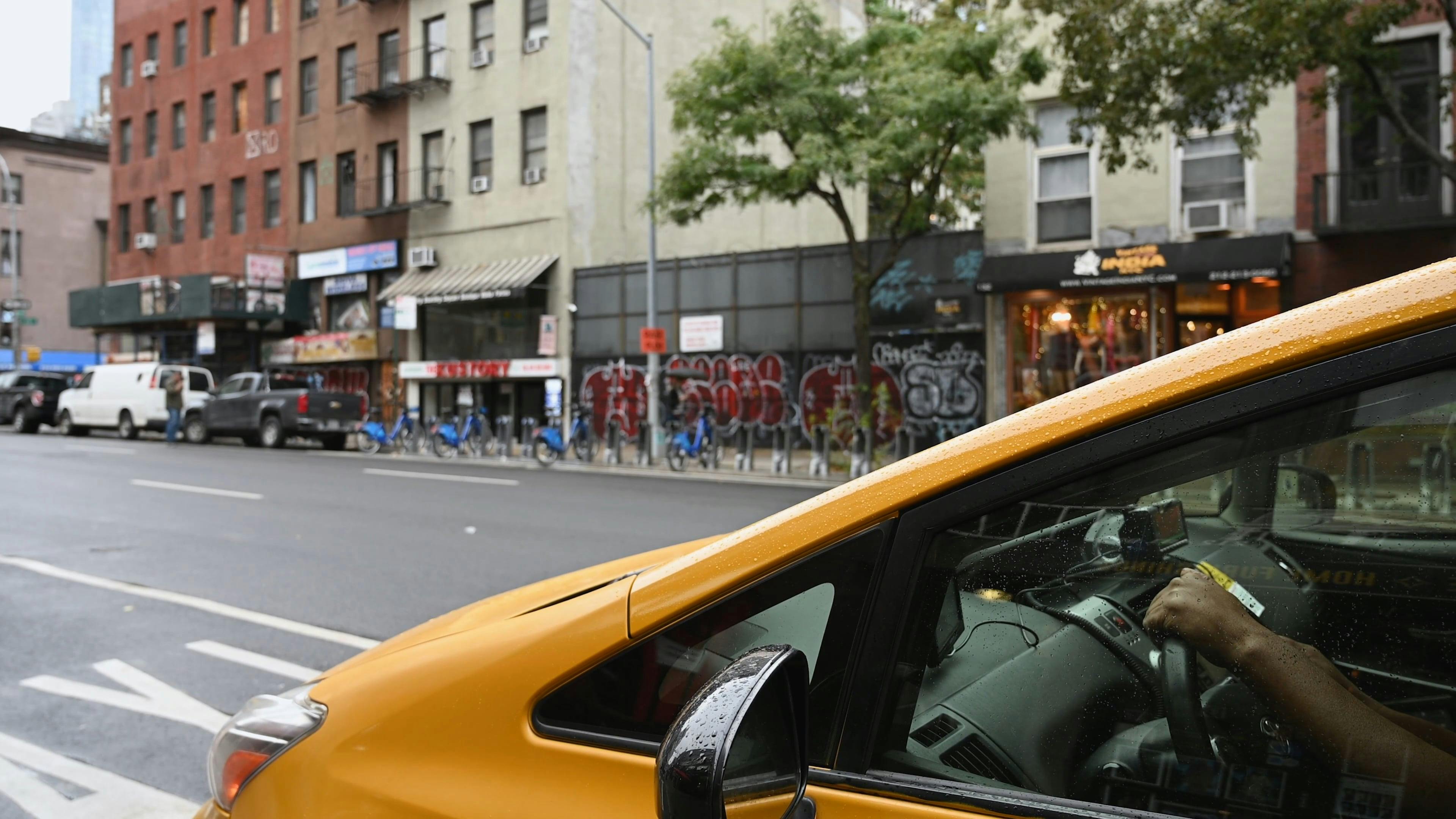 Person Waiting Inside the Yellow Cab on the Street Free Stock Video ...