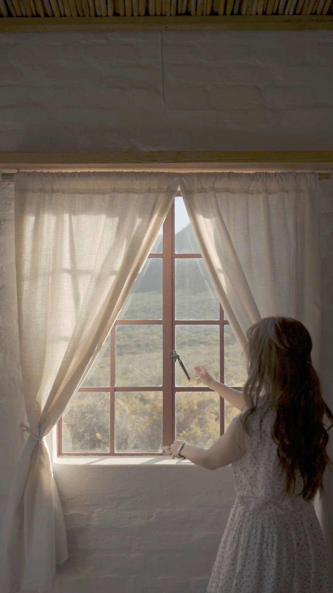 Vertical Video of a Lady Wearing White Dress Opening a Window Free ...