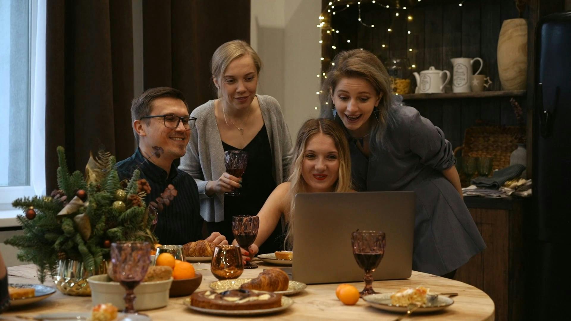 Group of Friends Sharing a Laptop · Free Stock Video