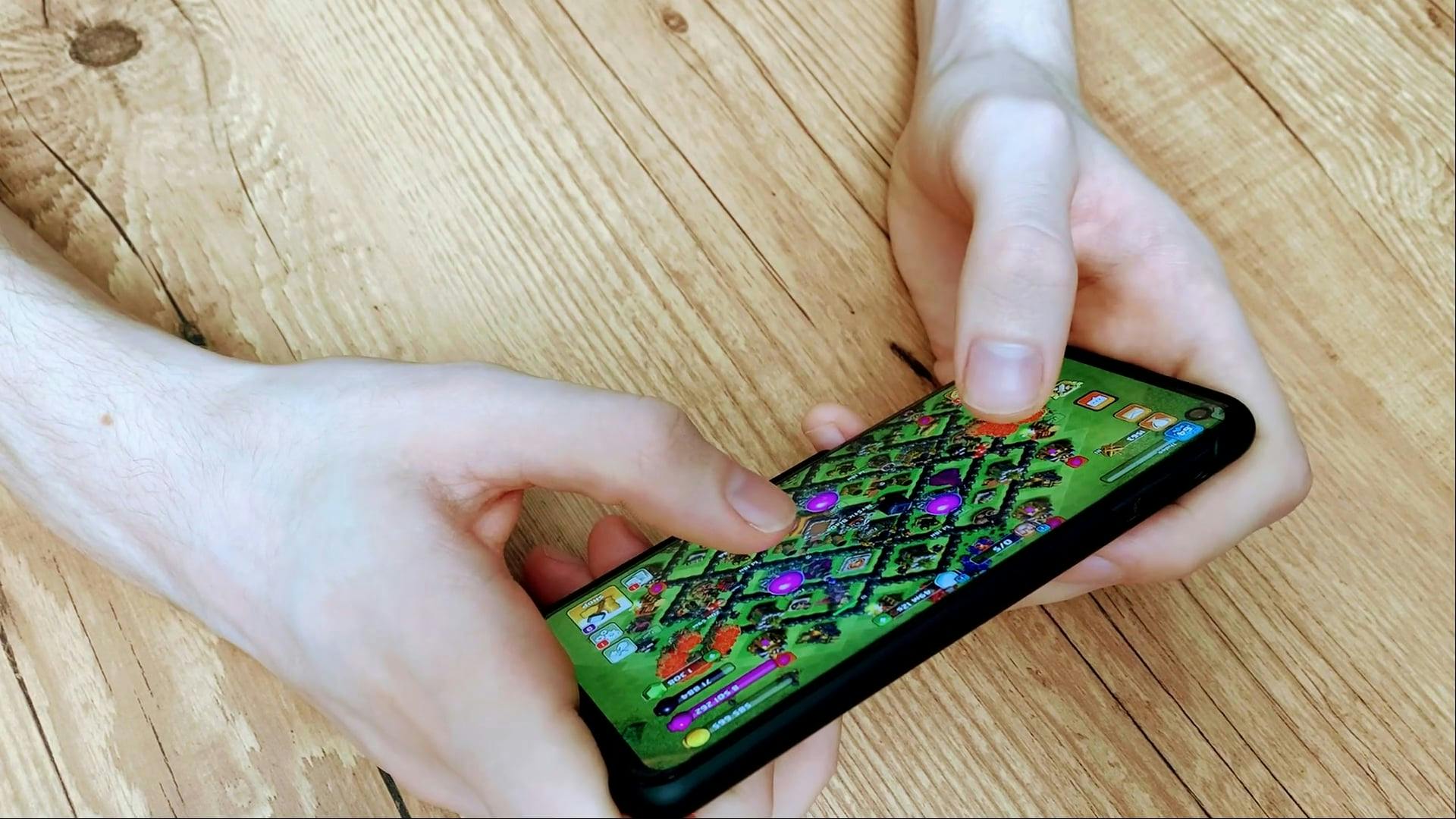 Person Playing A Game On Mobile Phone Free Stock Video Footage, Royalty ...