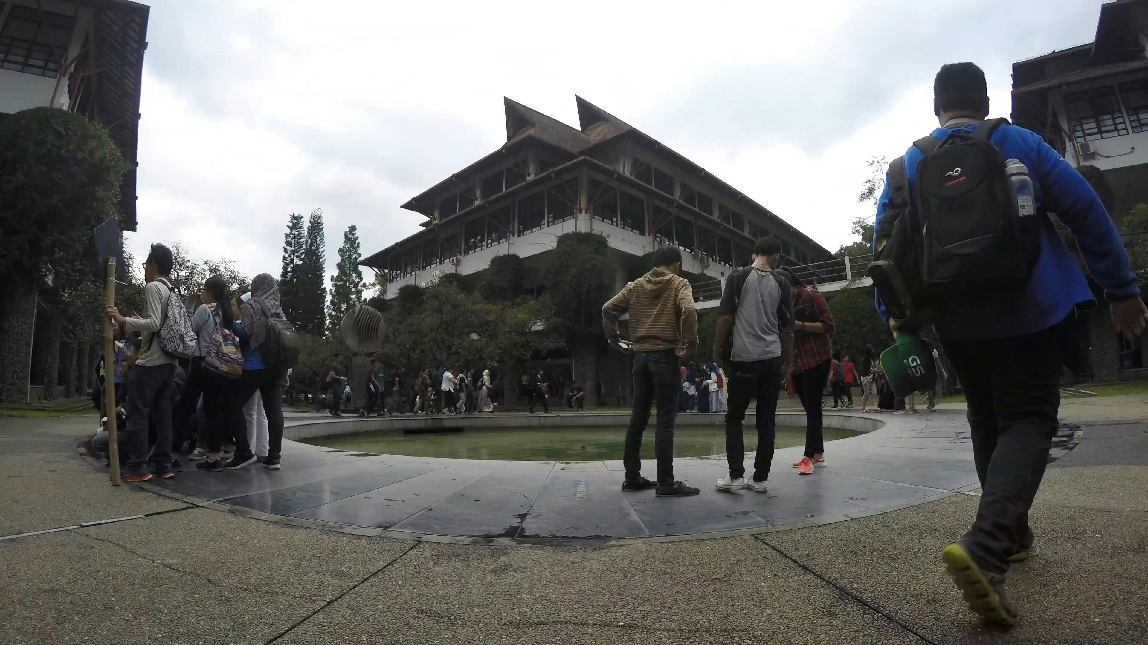 Crowds Gathering Around a Water Fountain Free Stock Video Footage ...