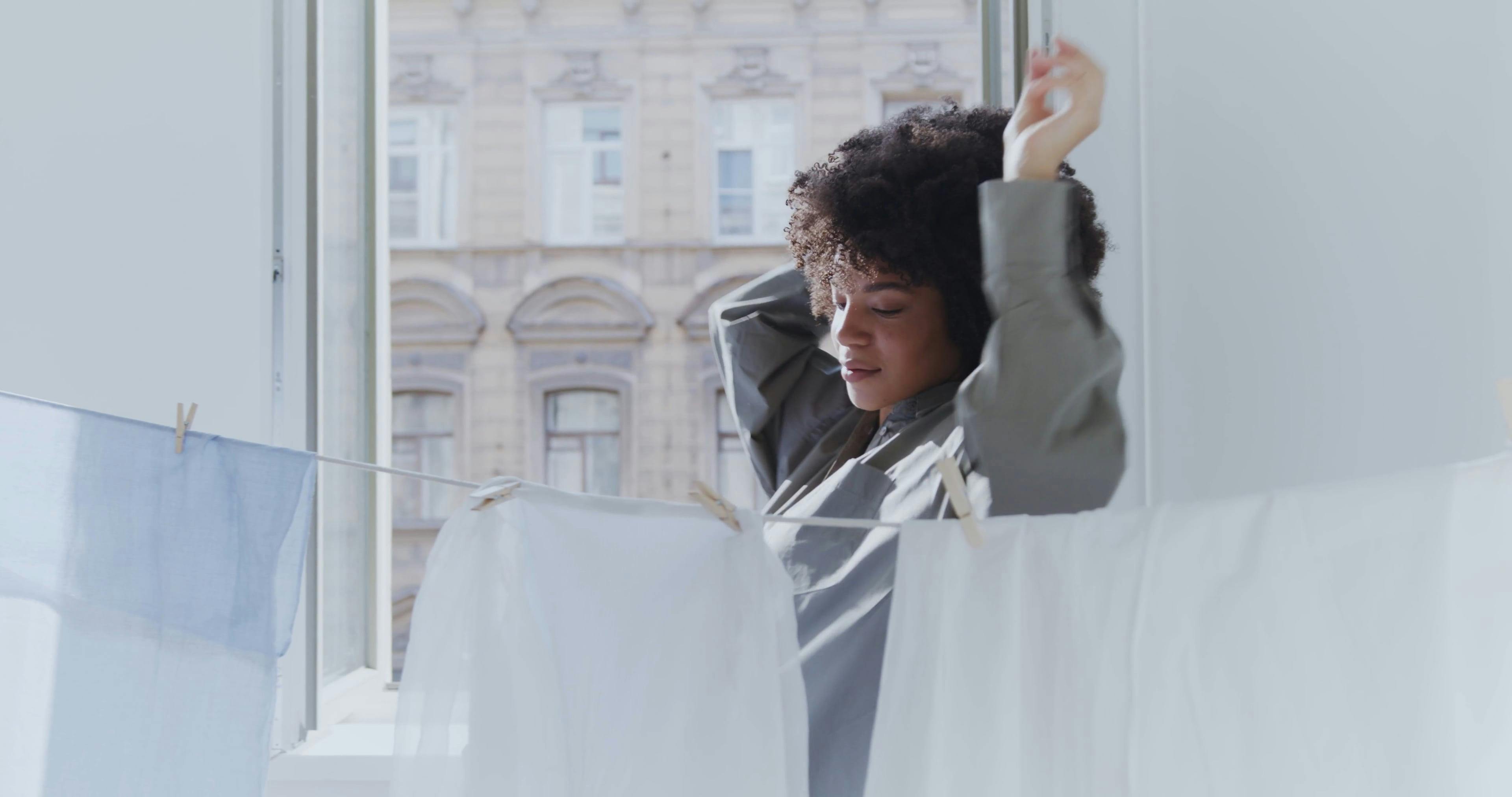 Woman Dancing Near a Window · Free Stock Video