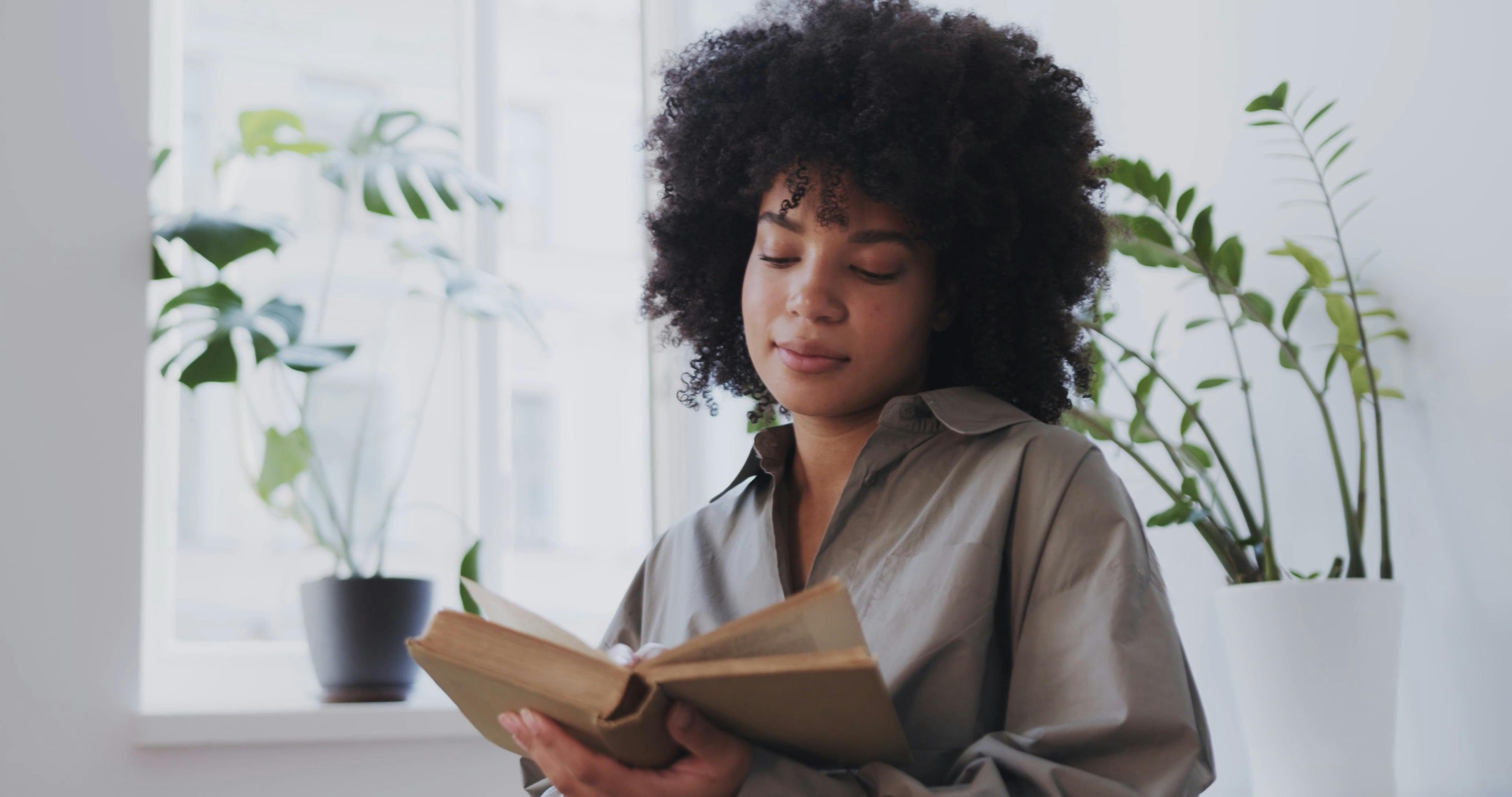 Woman Reading a Book · Free Stock Video
