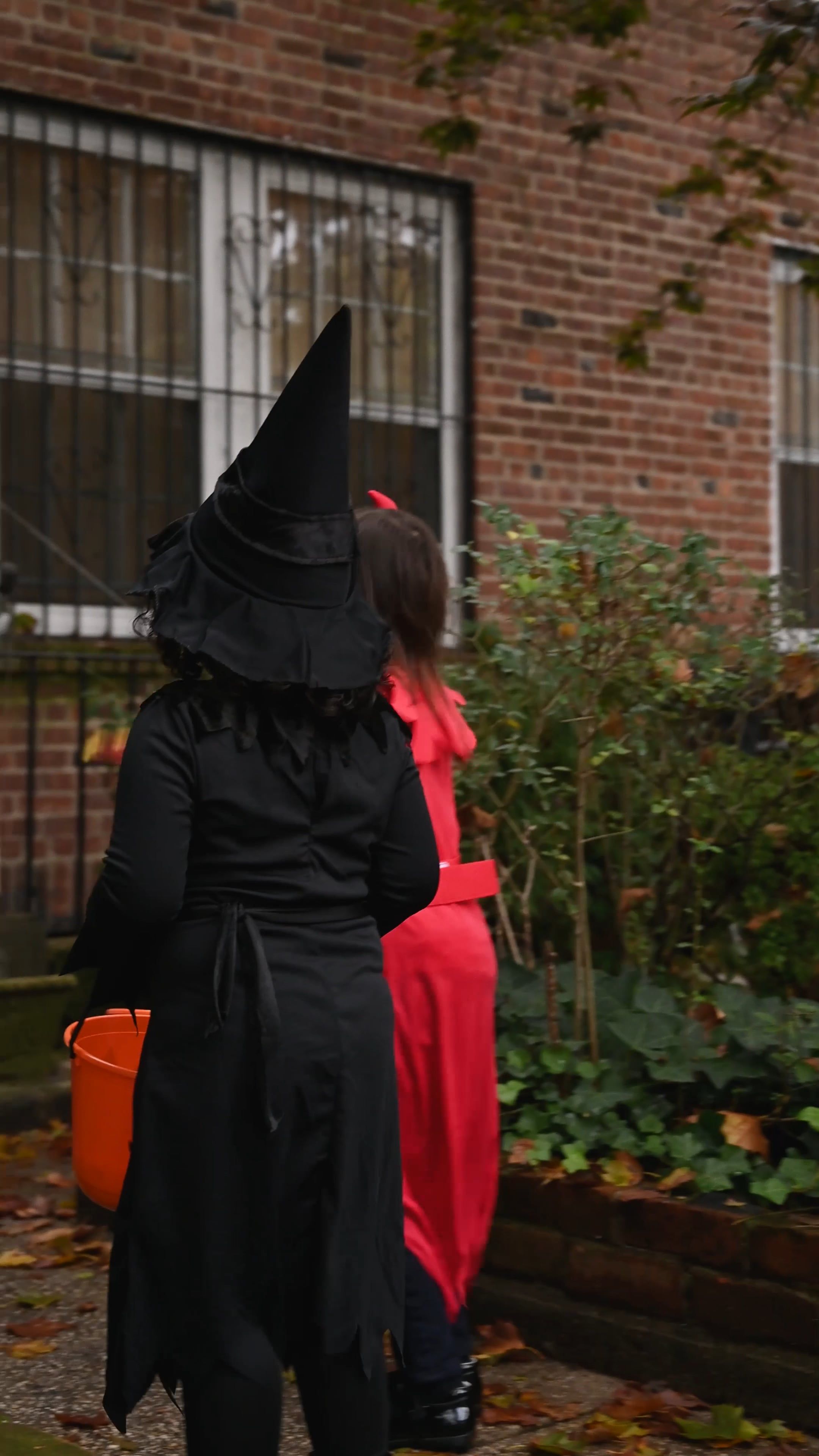 Children in Halloween Costumes Knocking on Door · Free Stock Video