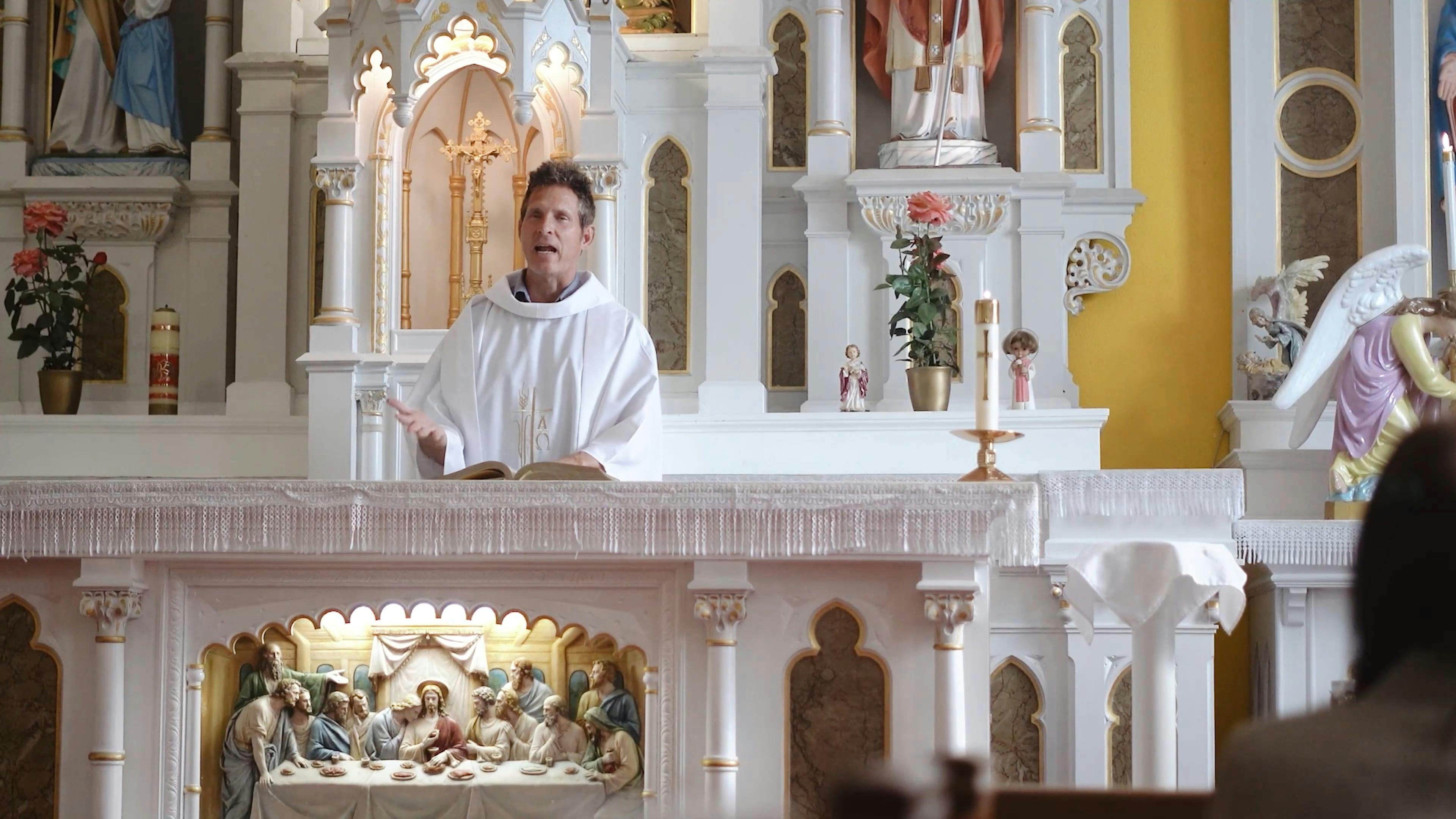 A Priest Talking · Free Stock Video