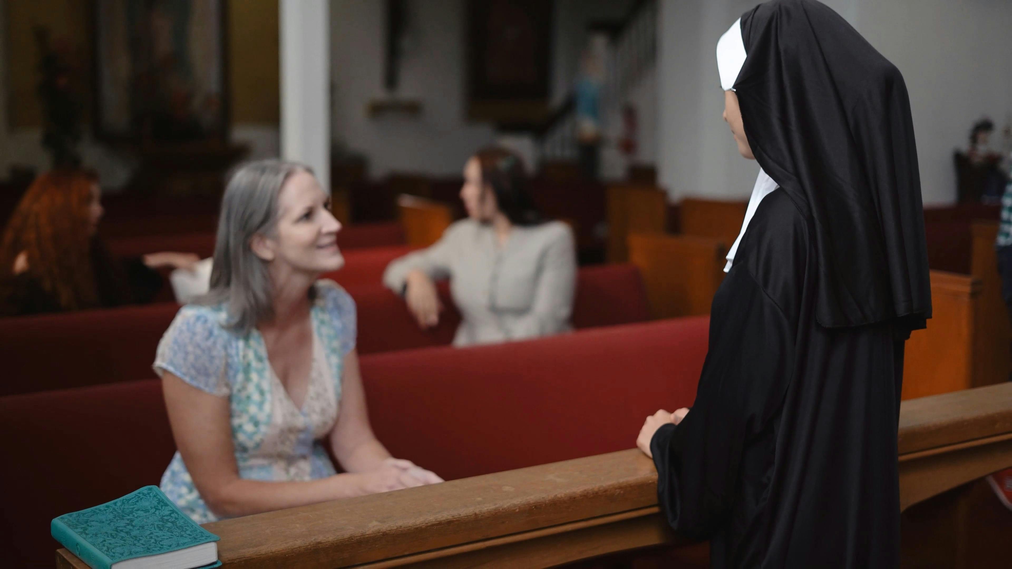 A Woman Talking to a Nun · Free Stock Video