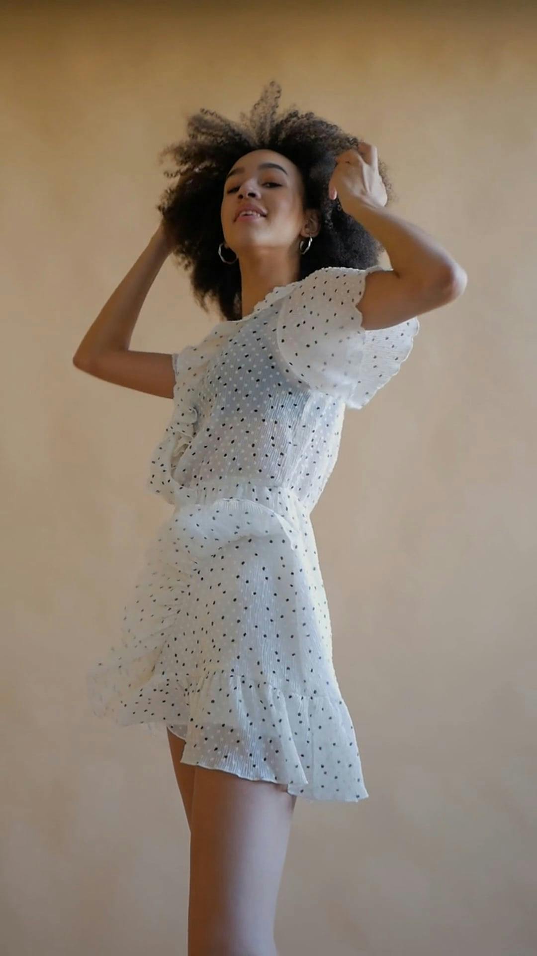 Elegant Woman with Curly Hair Twirling Free Stock Video Footage ...