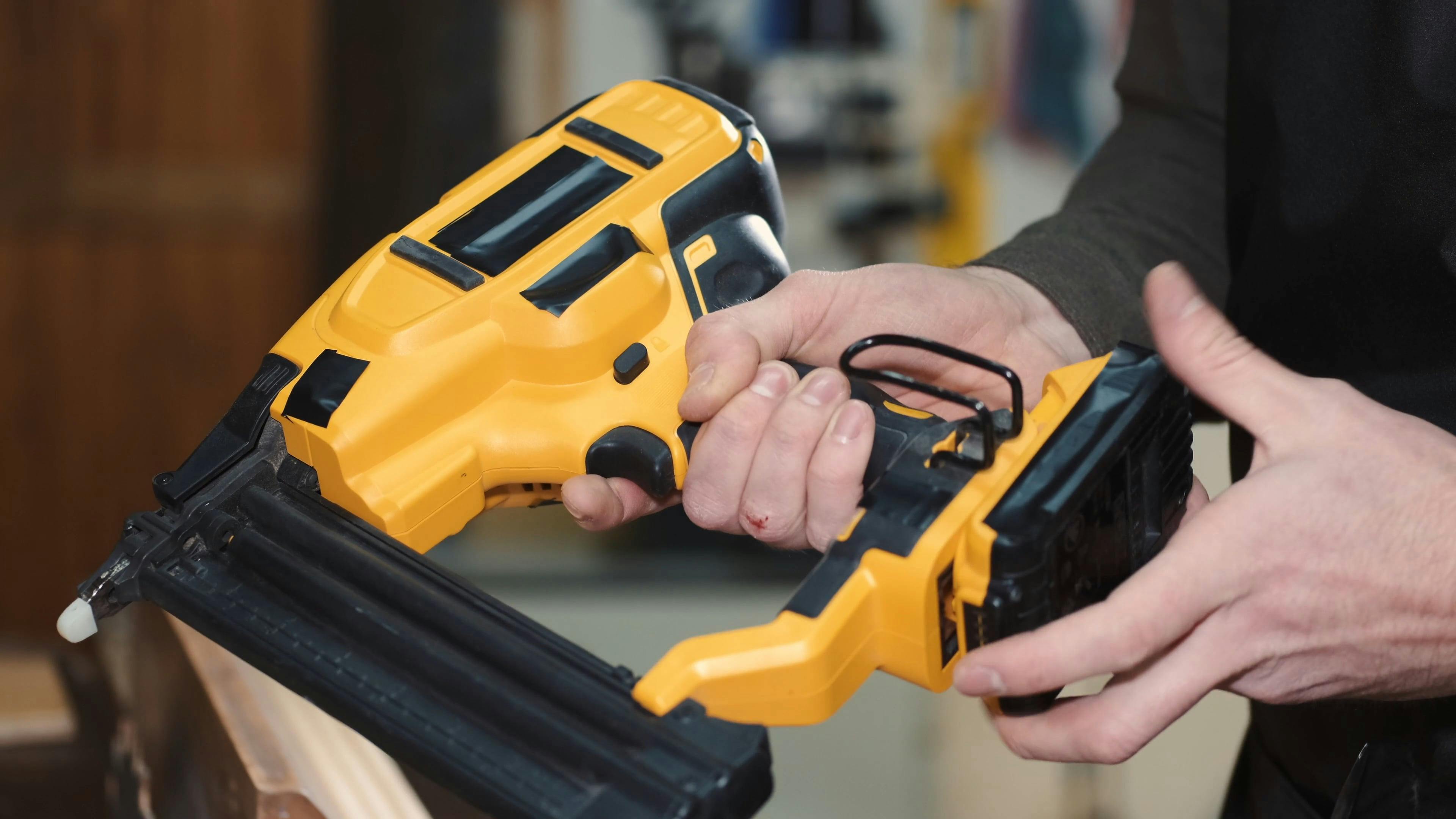 A Person Holding a Nail Gun Free Stock Video Footage, Royalty-Free 4K ...