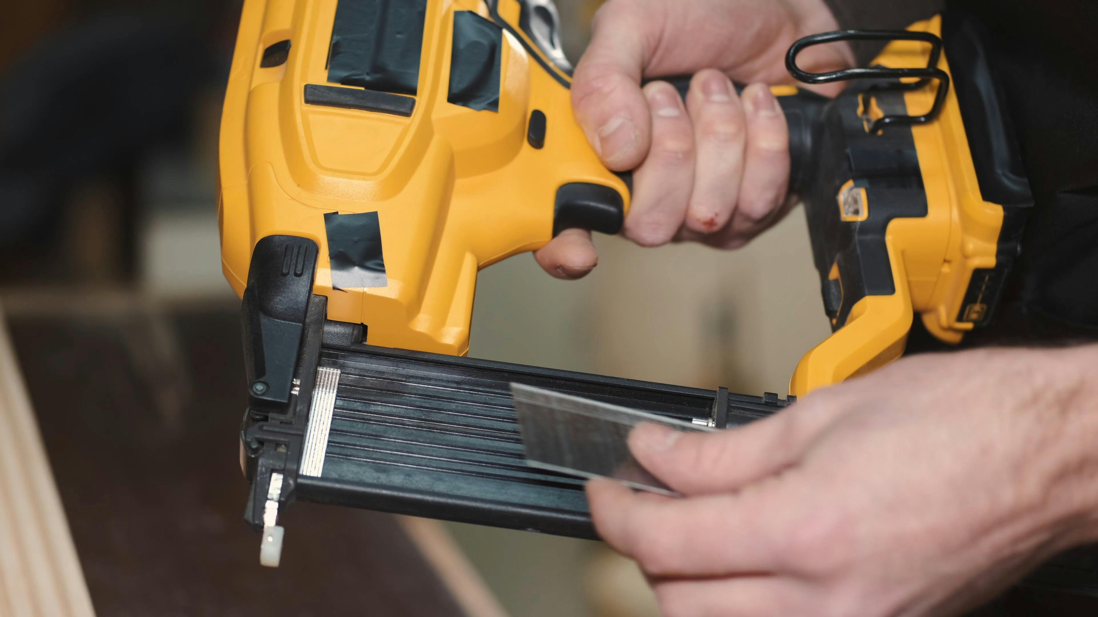 Person Putting Nails on a Nail Gun Free Stock Video Footage, Royalty ...