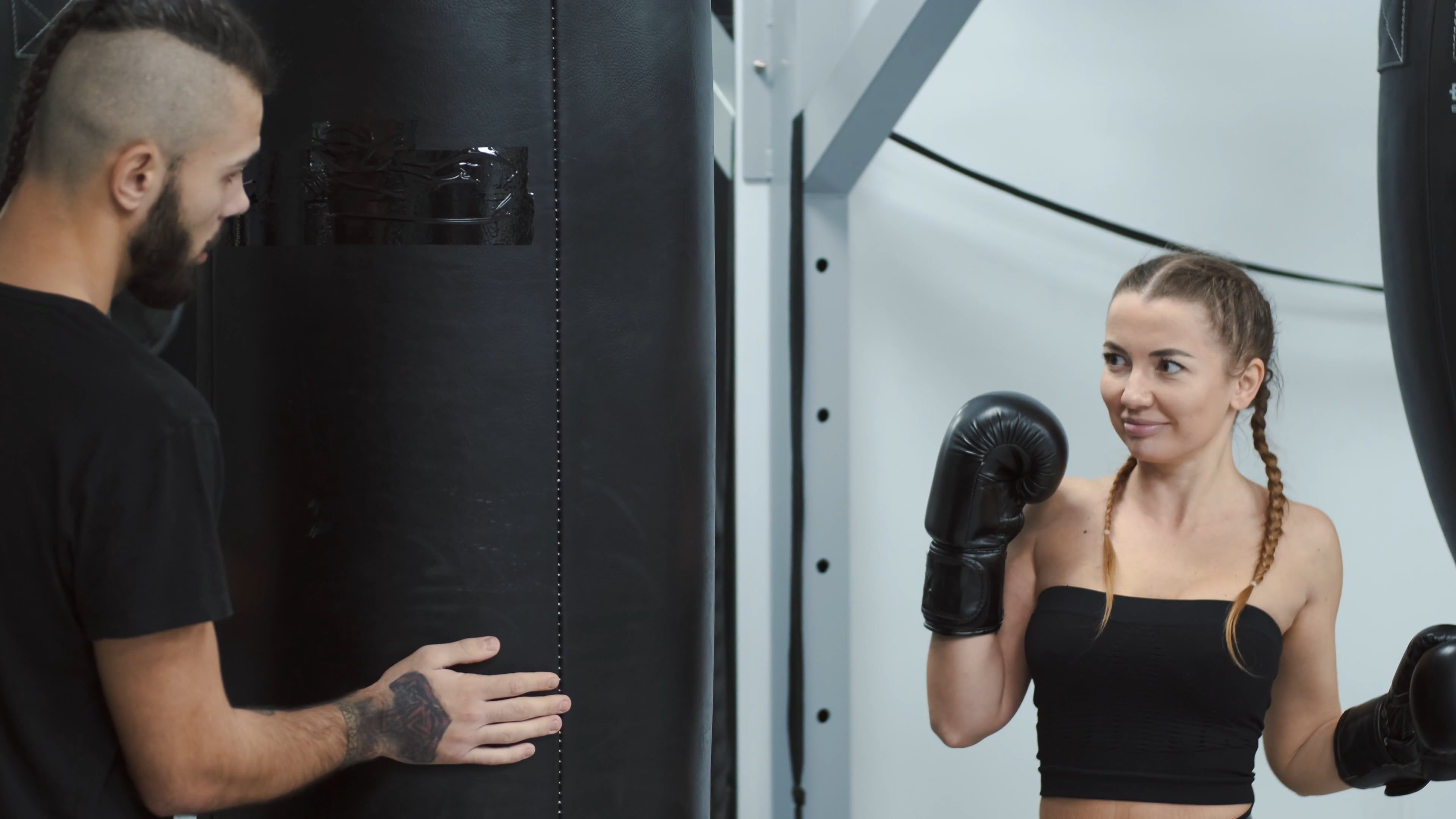 A Man Teaching Woman How to Punch in the Gym Free Stock Video Footage ...