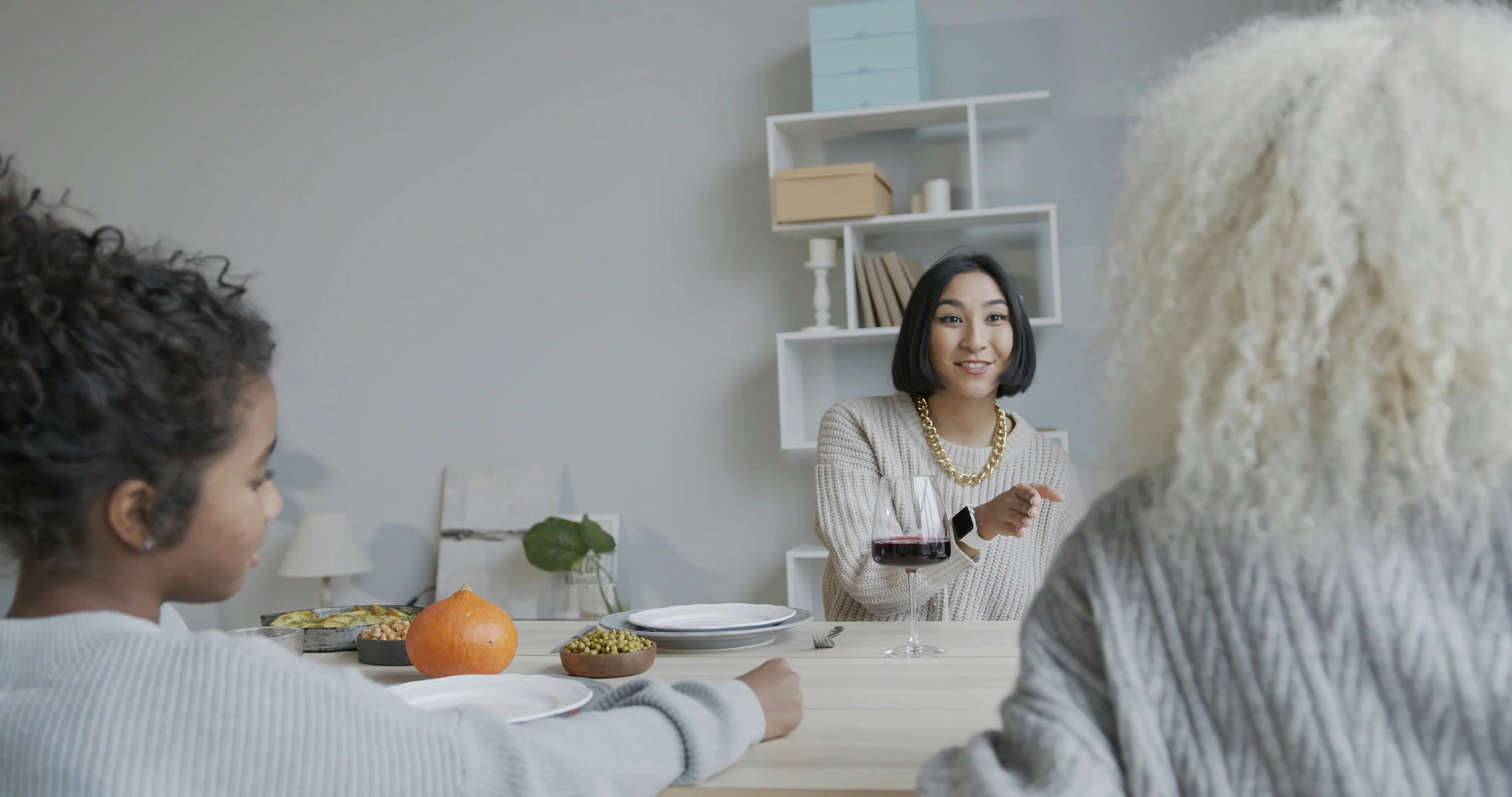 A Man Serving a Turkey on the Table while Celebrating Thanksgiving with ...