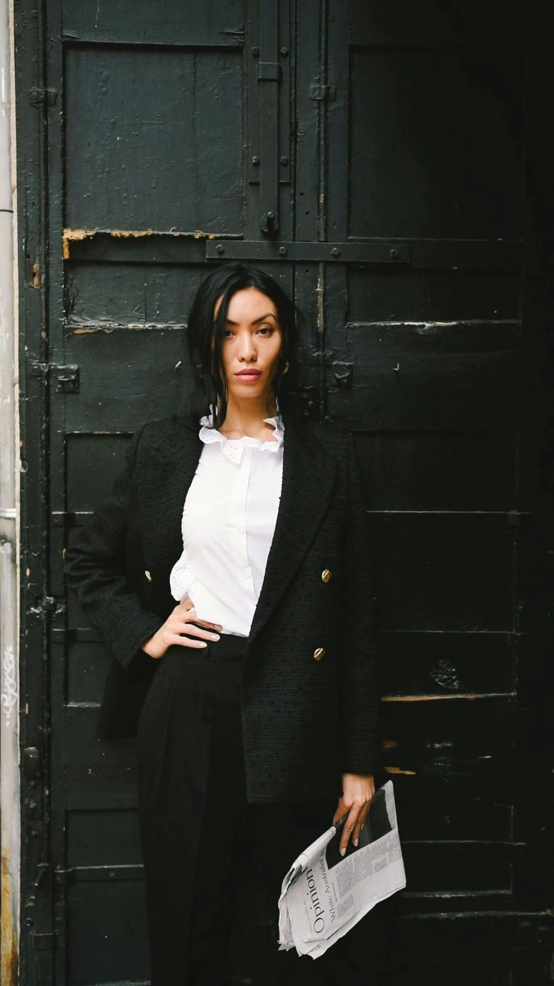 Woman Modeling with a Newspaper Free Stock Video Footage, Royalty-Free ...