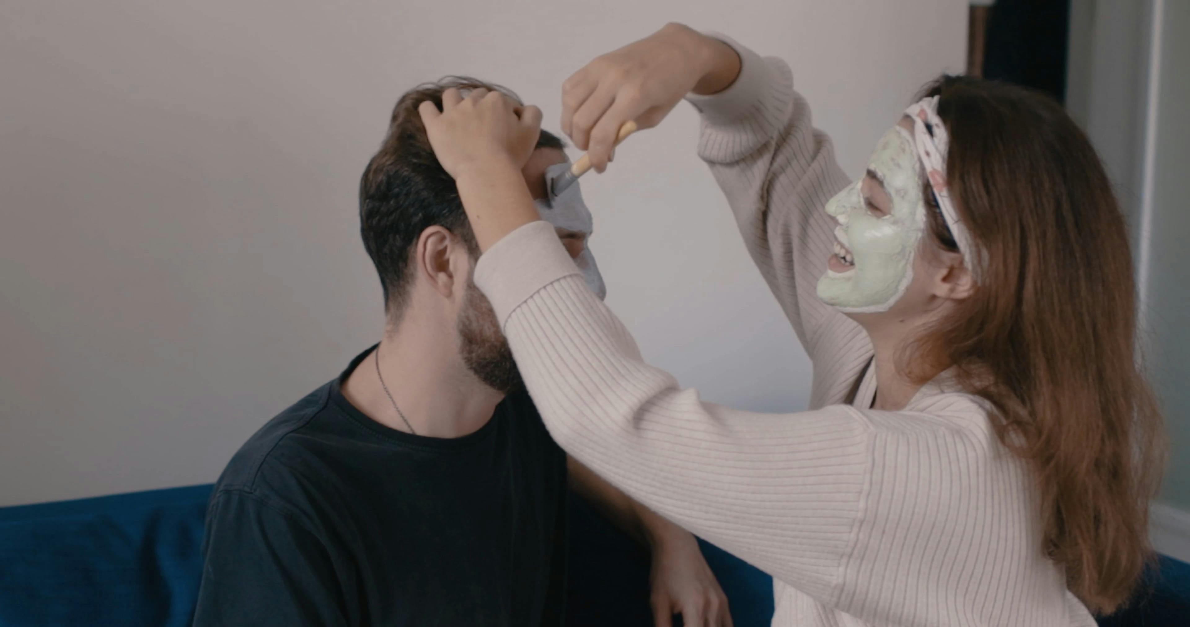A Woman Applying Facial Mask to his Partner · Free Stock Video
