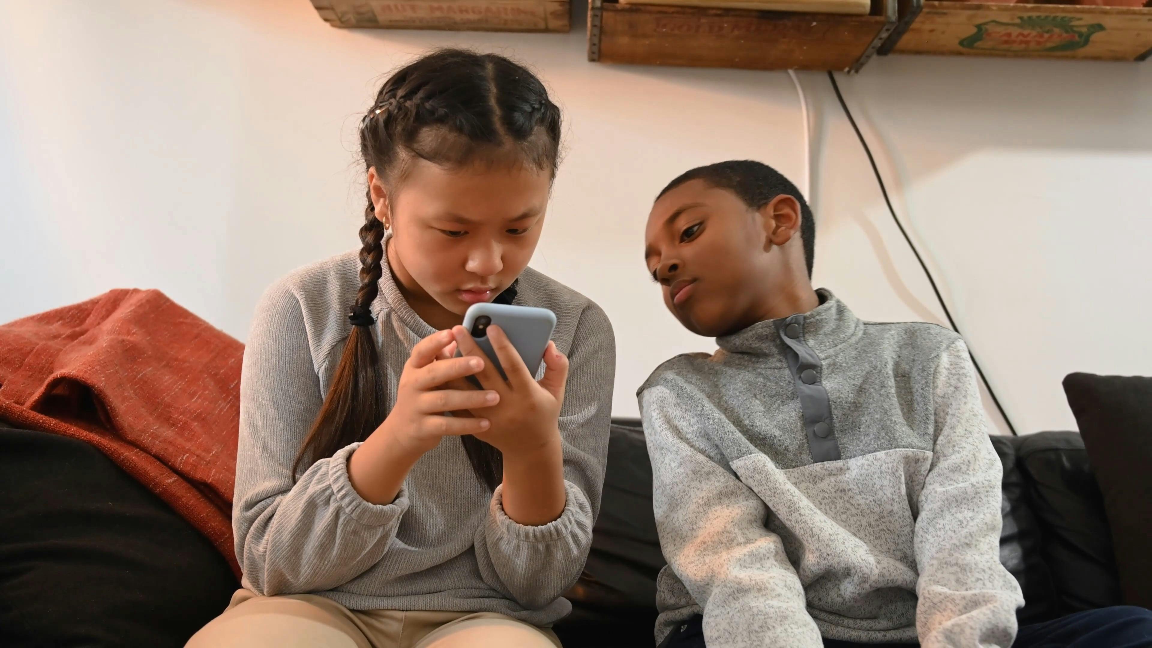 Kids Watching on a Smartphone Free Stock Video Footage, Royalty-Free 4K ...