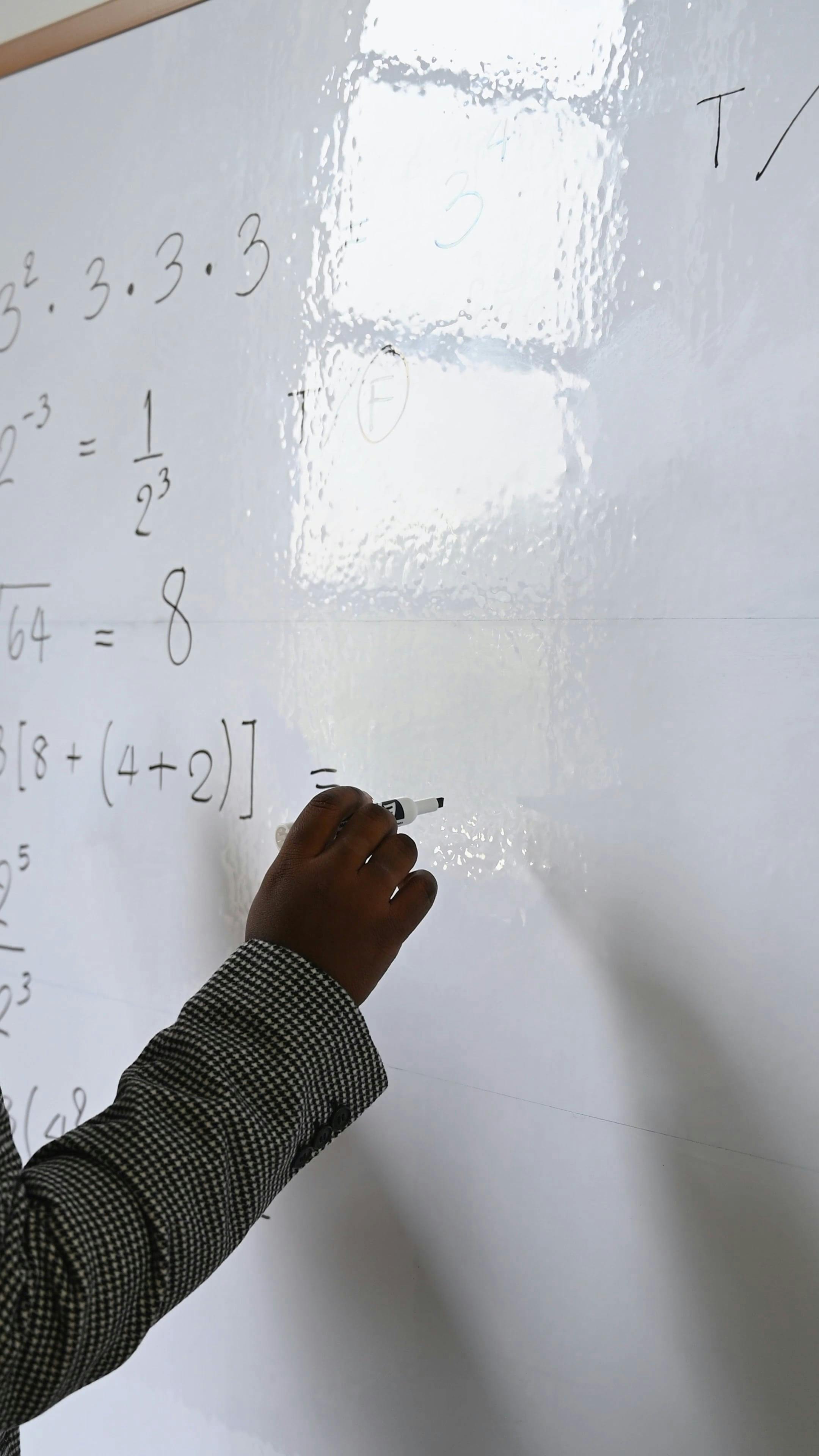 Teacher Writing on Whiteboard · Free Stock Video