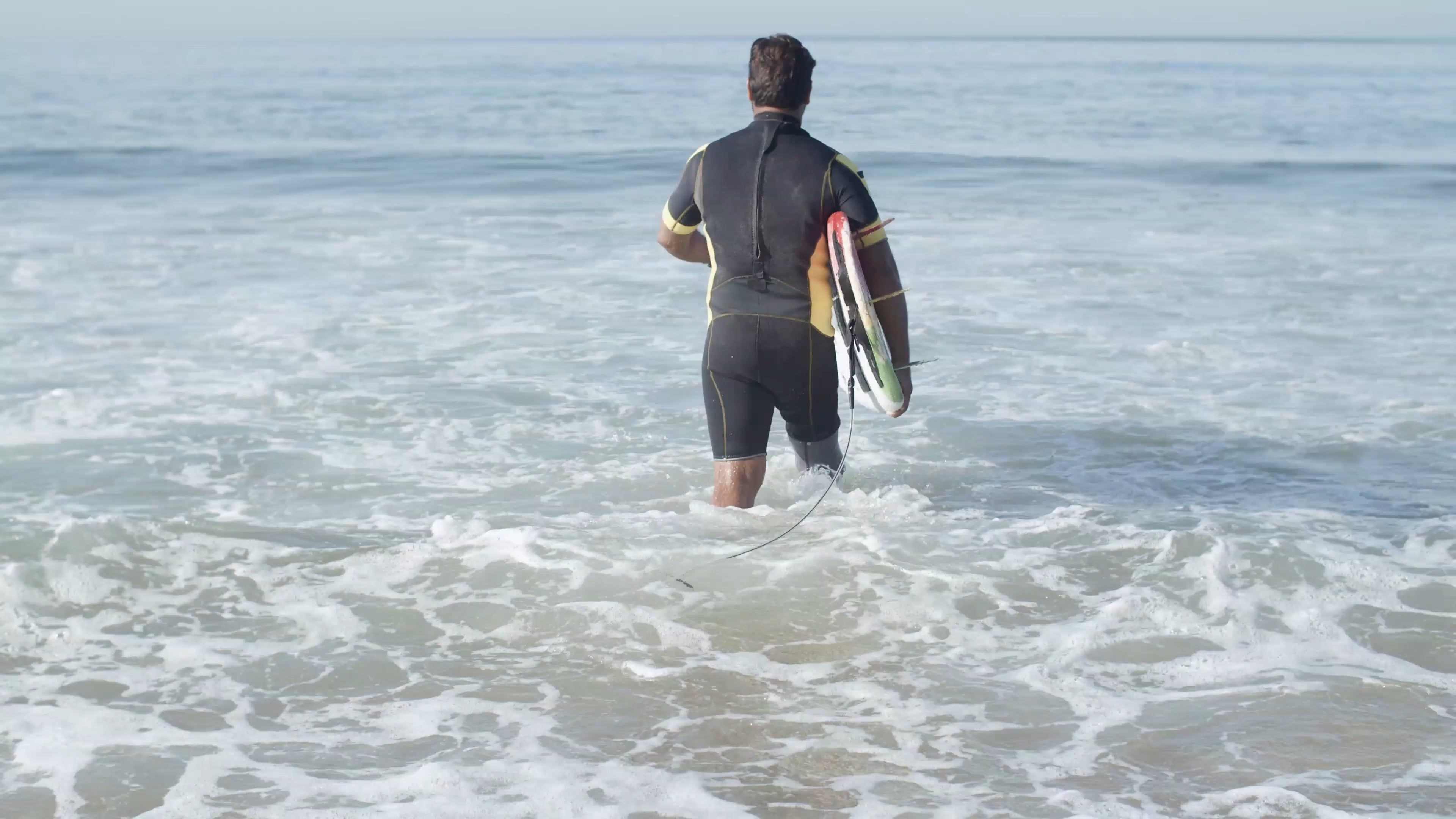 Surfer with Prosthetic Leg Entering the Sea Free Stock Video Footage ...