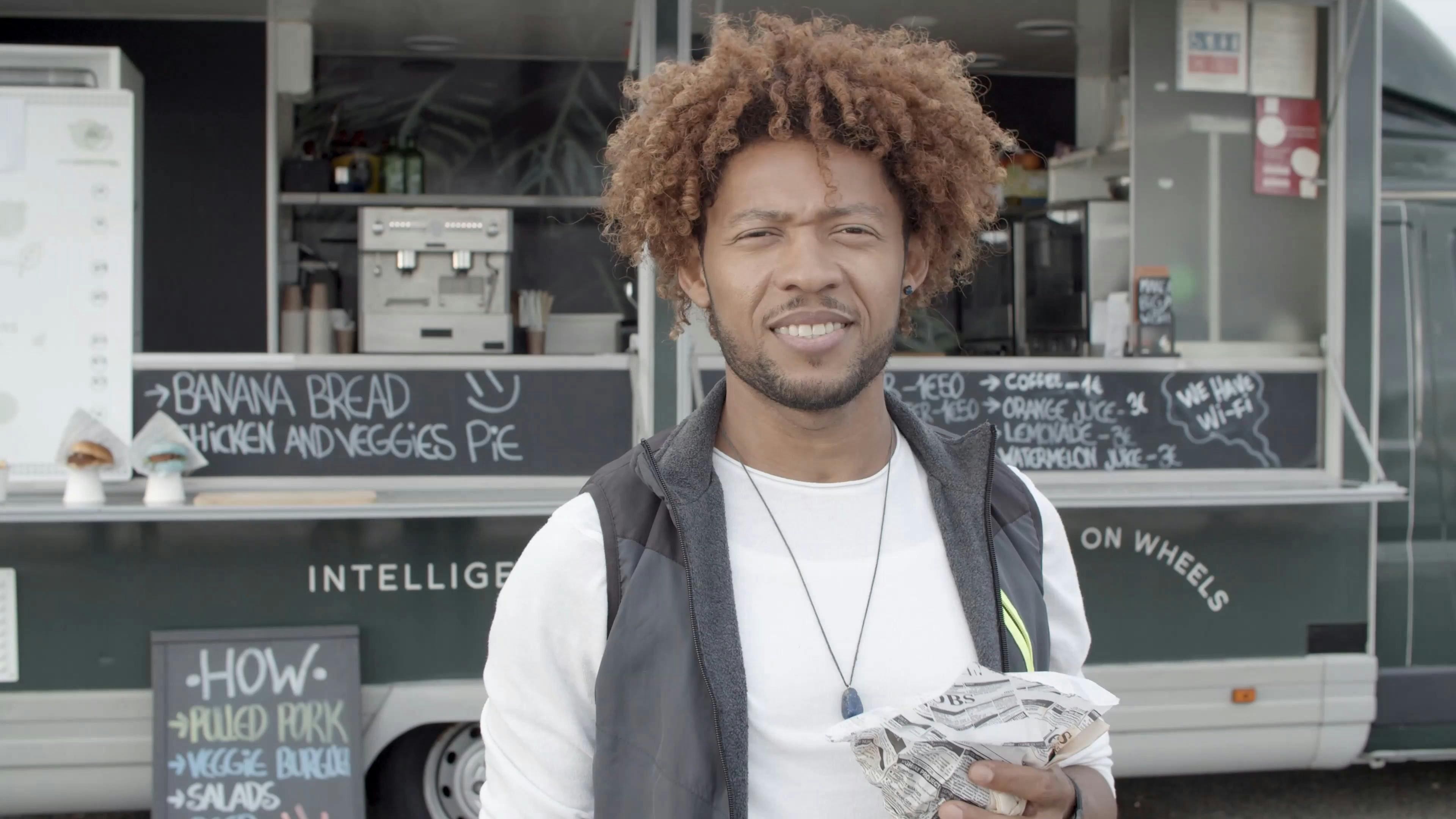 Man Looking at Camera and Eating · Free Stock Video