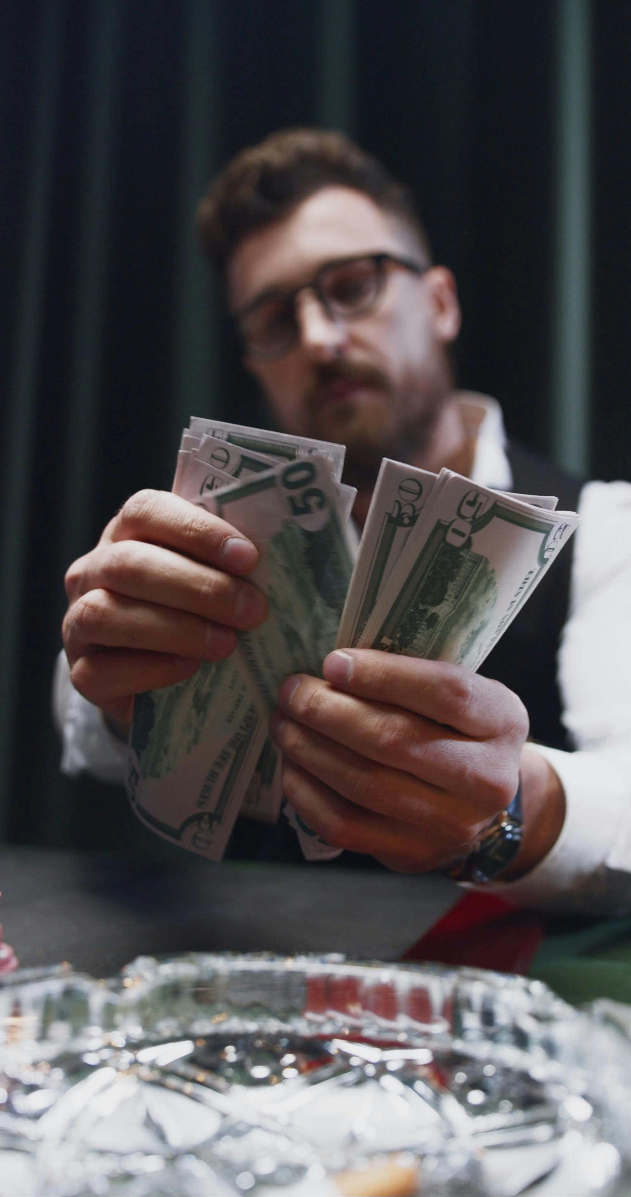 A Guy Counting Cash · Free Stock Video