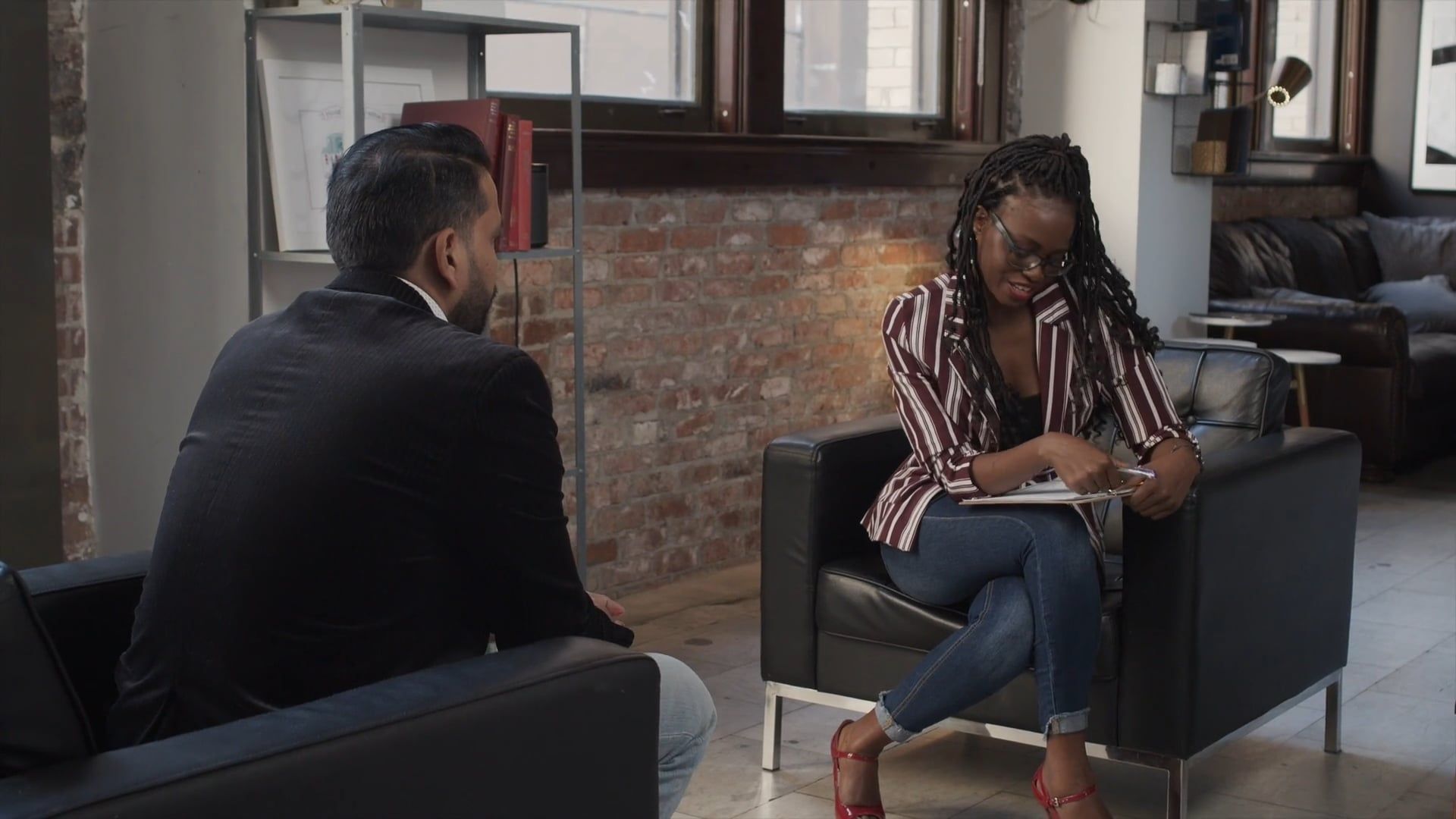 A Woman Doing an Interview with a Man · Free Stock Video
