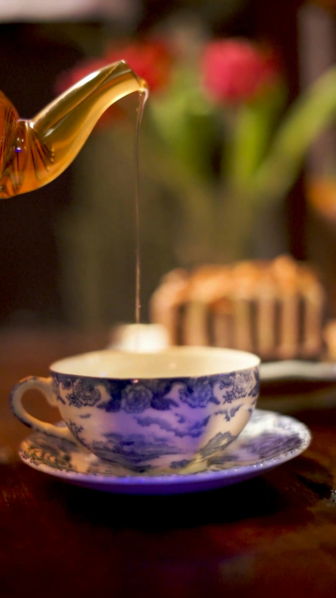 Pouring Tea On Teacup · Free Stock Video