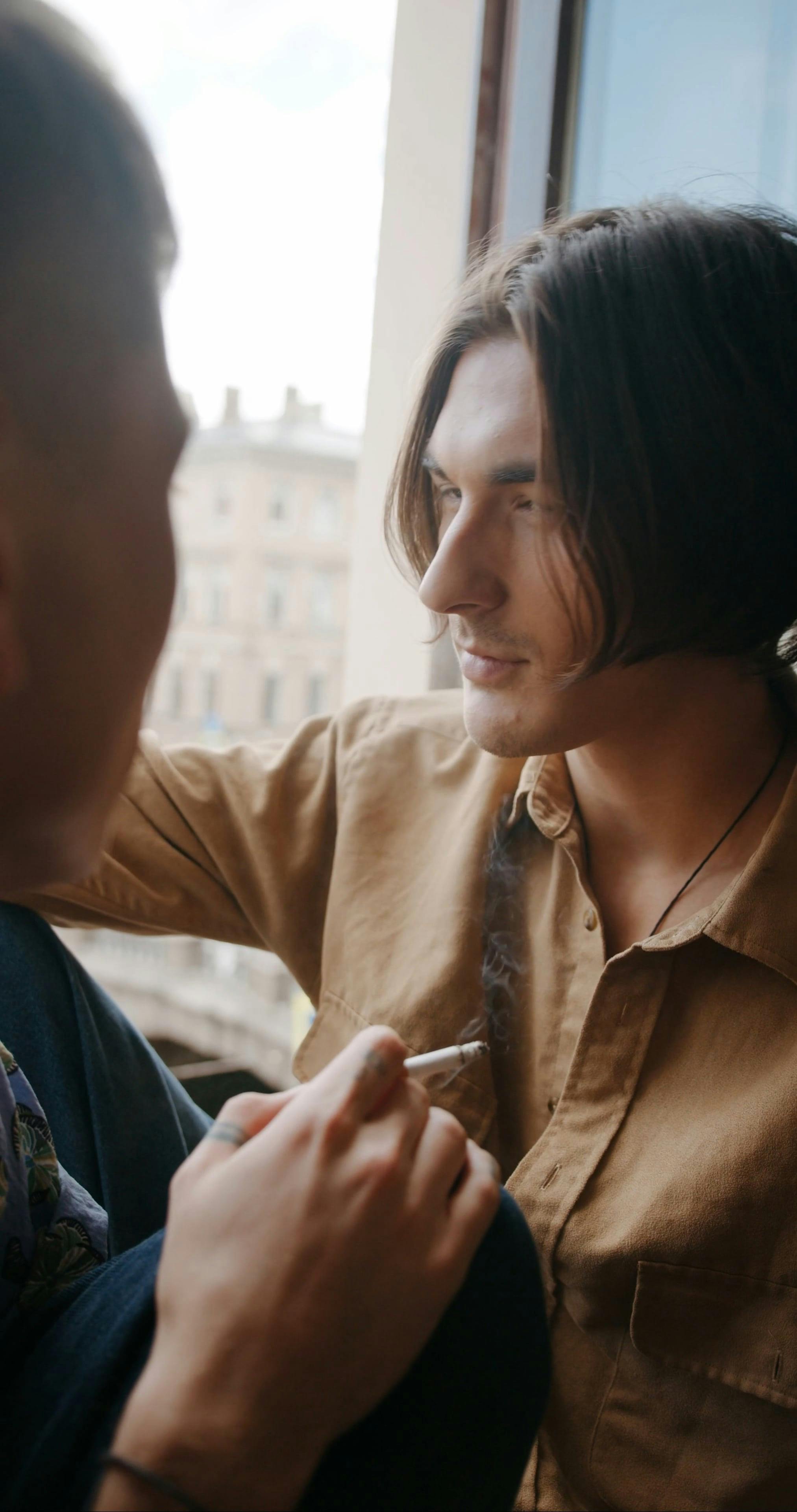 Two Guys Smoking on the Same Cigarette Free Stock Video Footage ...