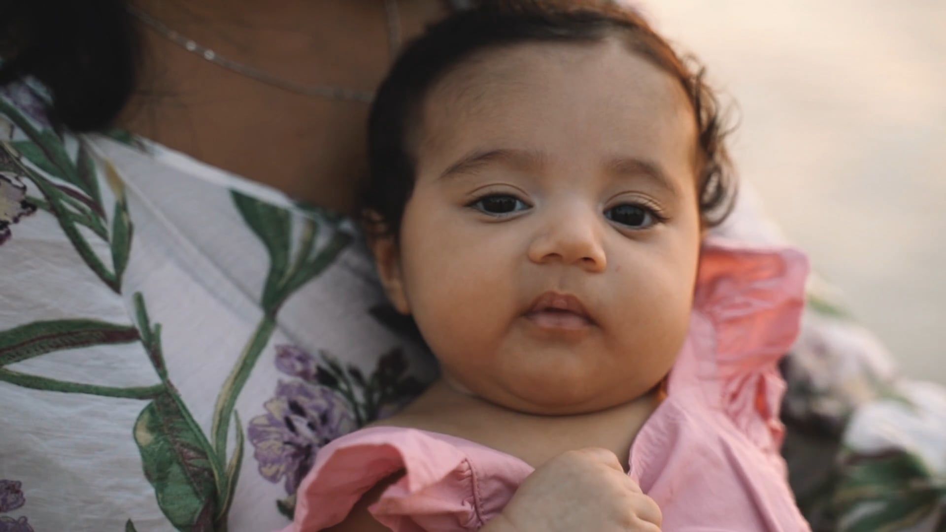 A Close Up View of a Baby Girl Carried by a Woman Free Stock Video ...