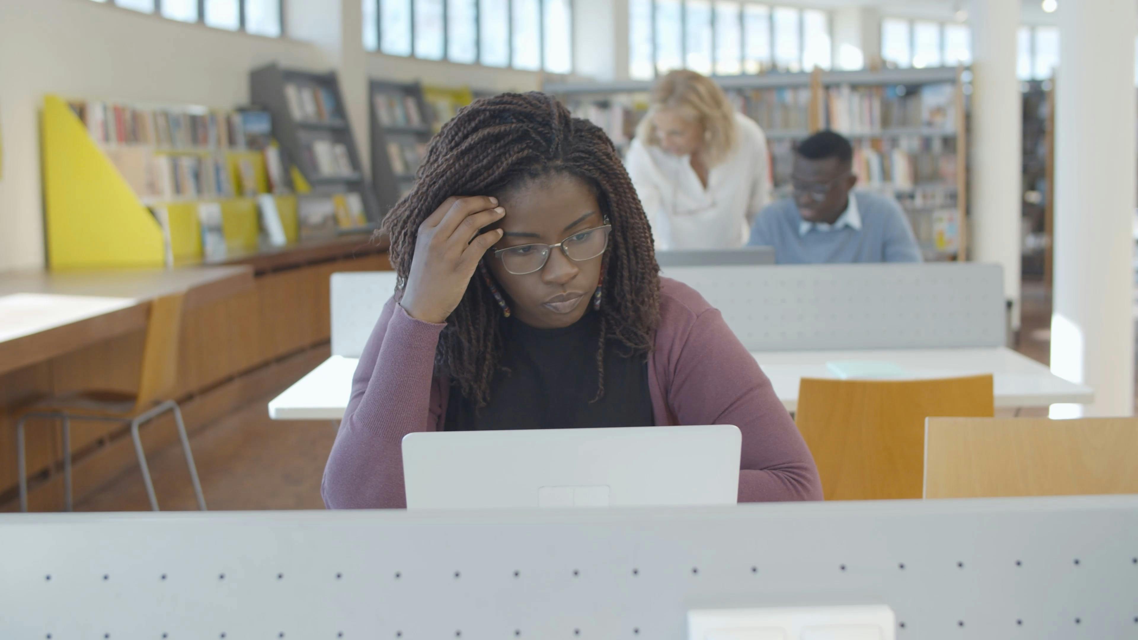 Woman Using a Laptop in a Library Free Stock Video Footage, Royalty ...