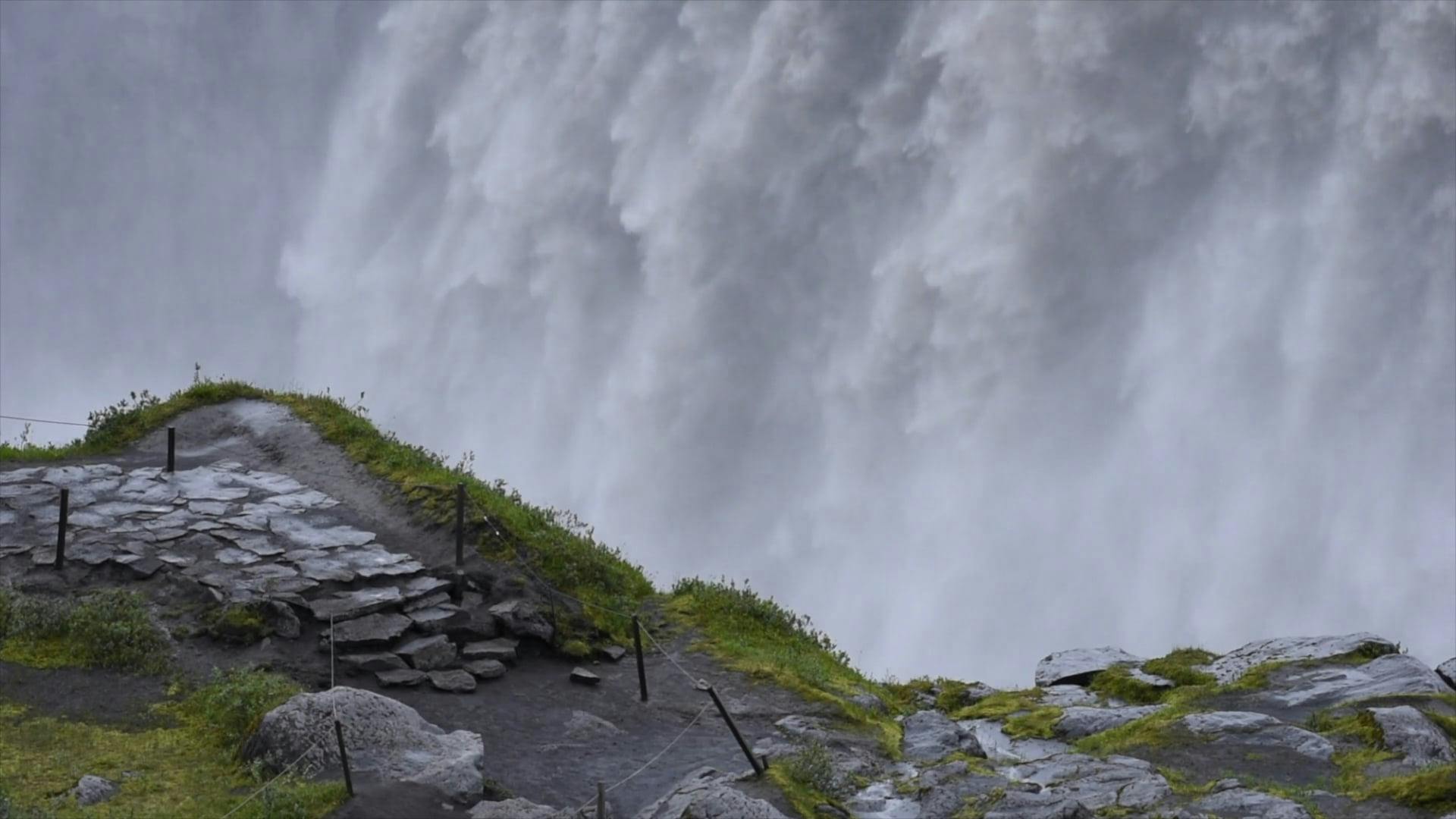 A Waterfalls Cascading Through Multi-layer Of Rocks Formation Free ...