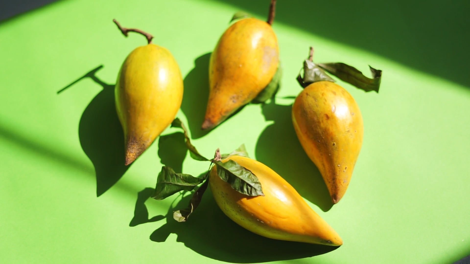 Fresh Canistel Fruit on Green Table · Free Stock Video