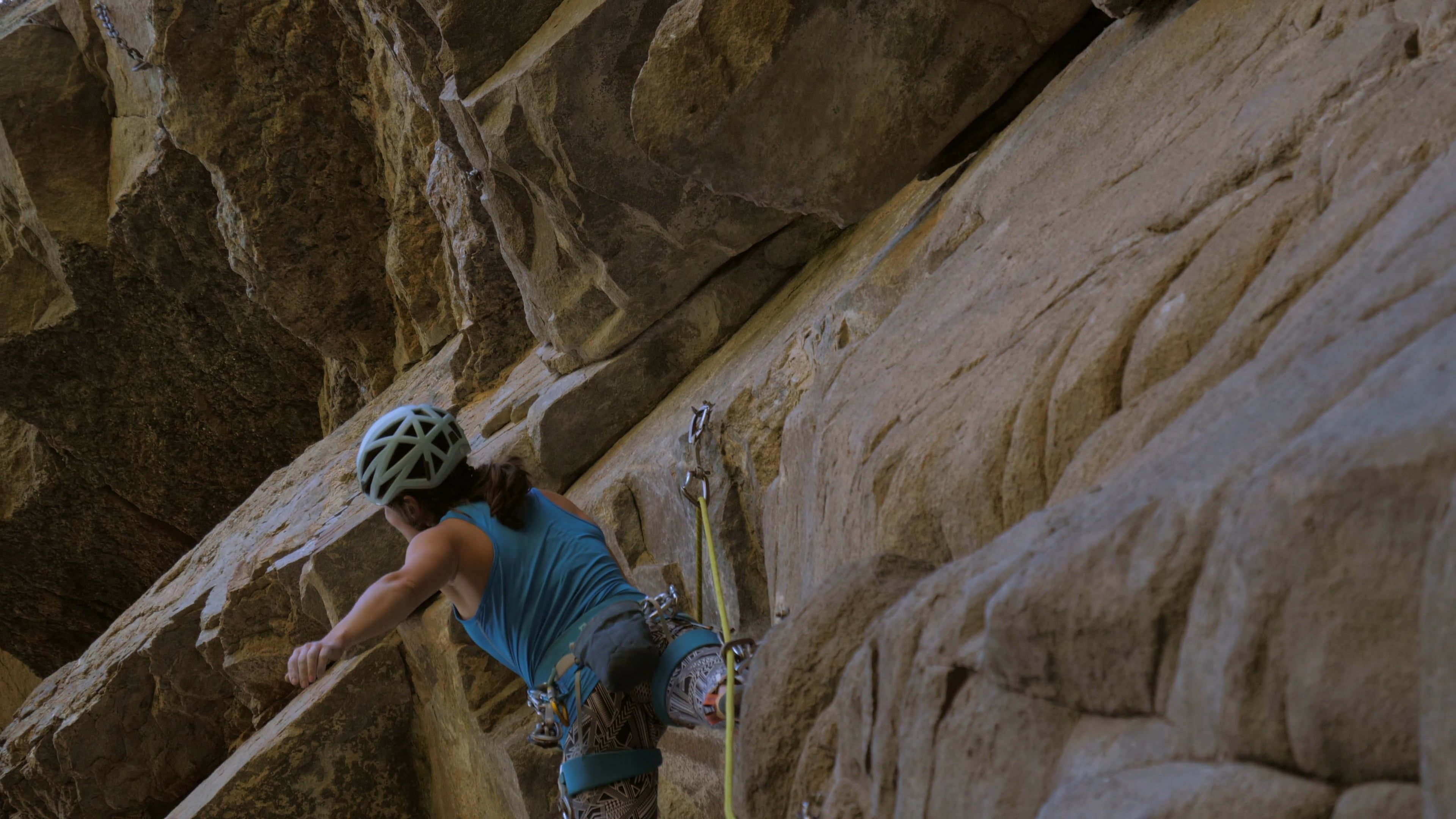 Low Angle View of a Woman Rock Climbing · Free Stock Video