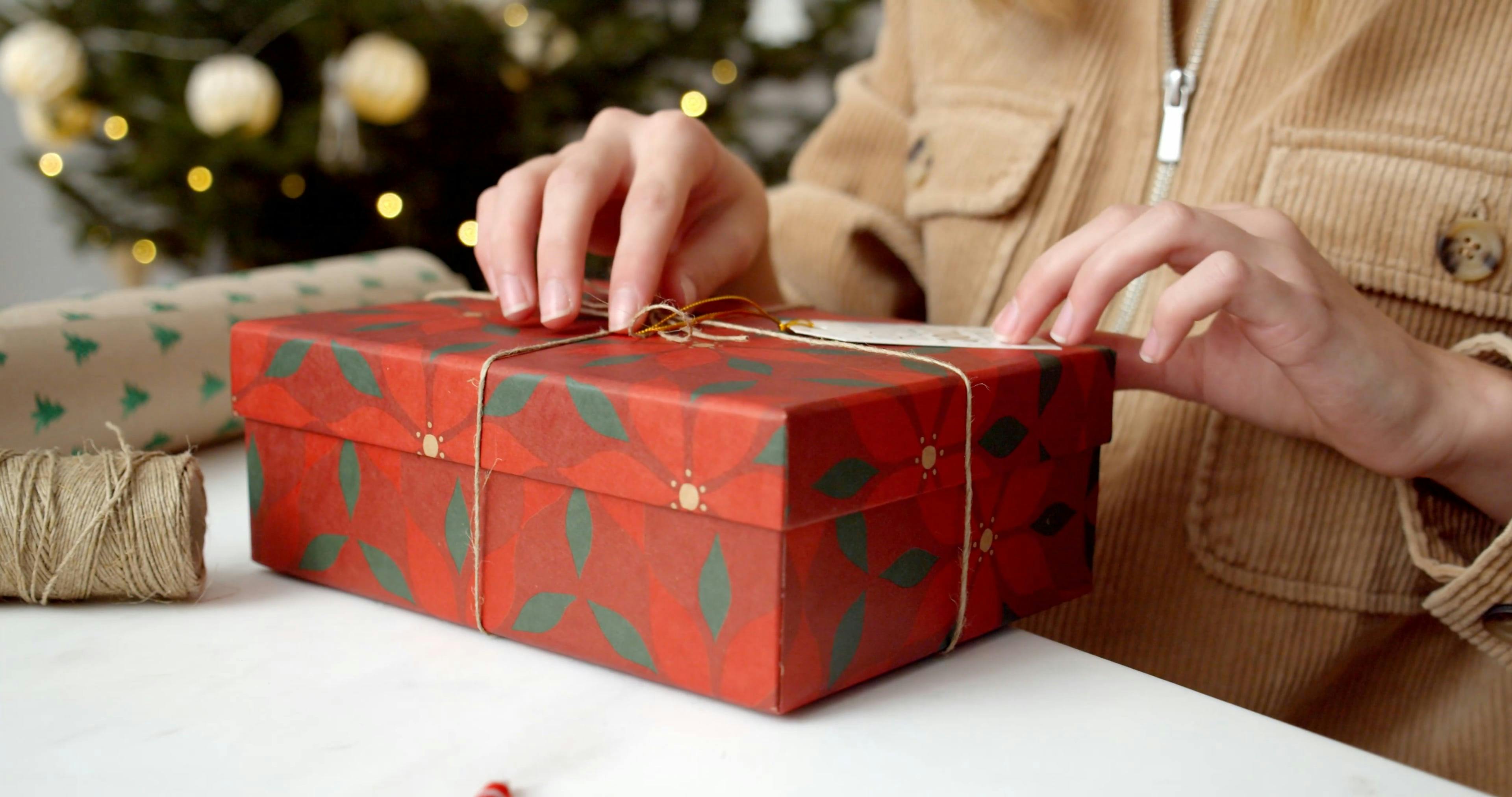 Person Wrapping Christmas Presents Free Stock Video Footage, Royalty ...