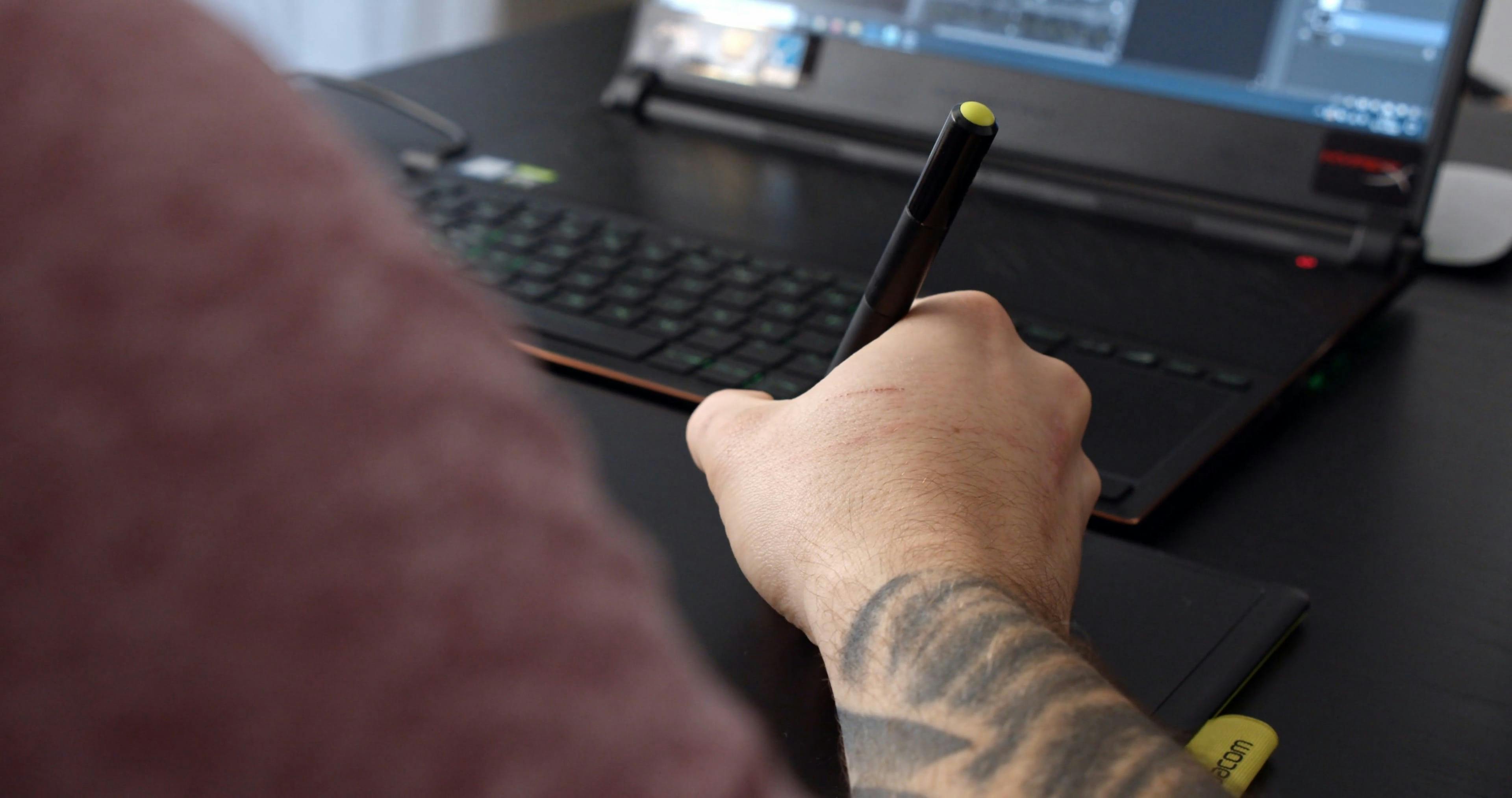 Hands Using a Pad · Free Stock Video