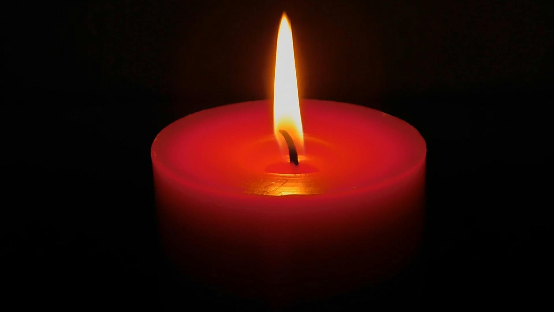 Close Up View of a Lighted Red Candle Free Stock Video Footage, Royalty ...