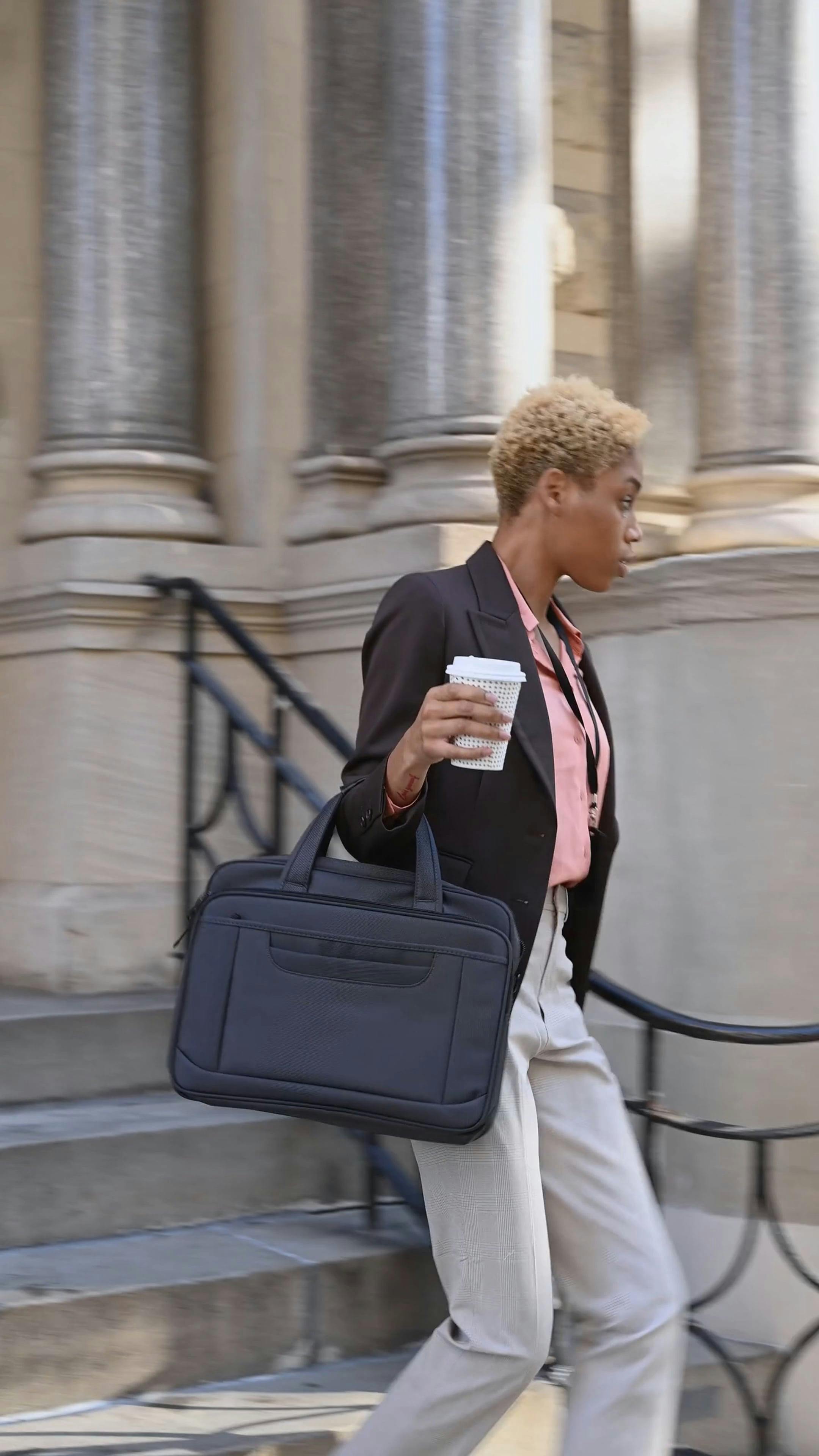 A Woman Exiting A Building · Free Stock Video