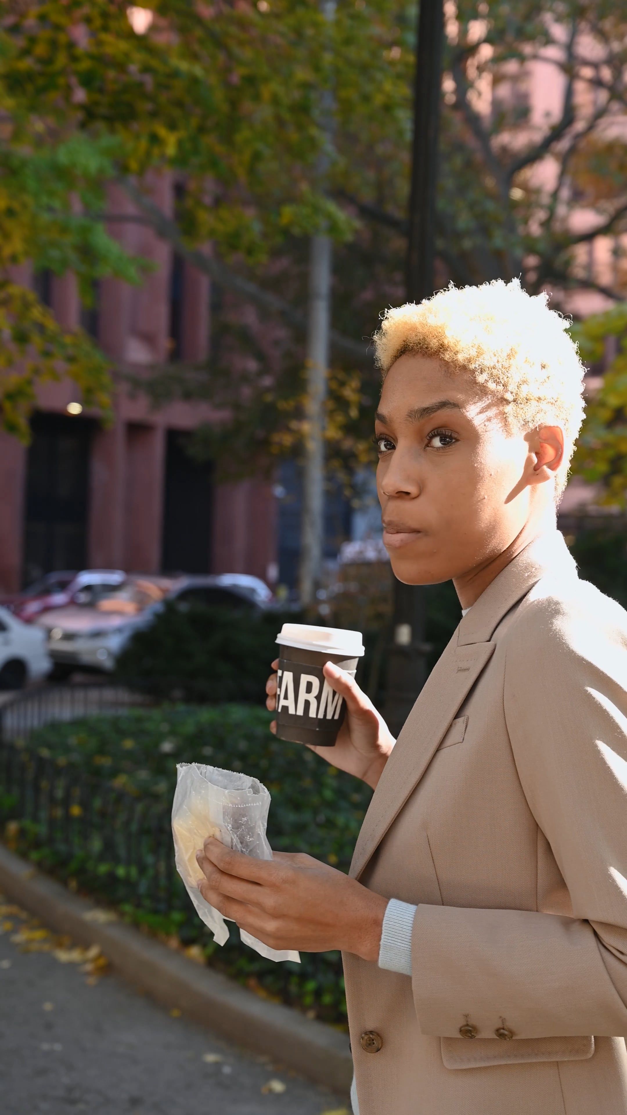 A Woman Eating While Walking · Free Stock Video