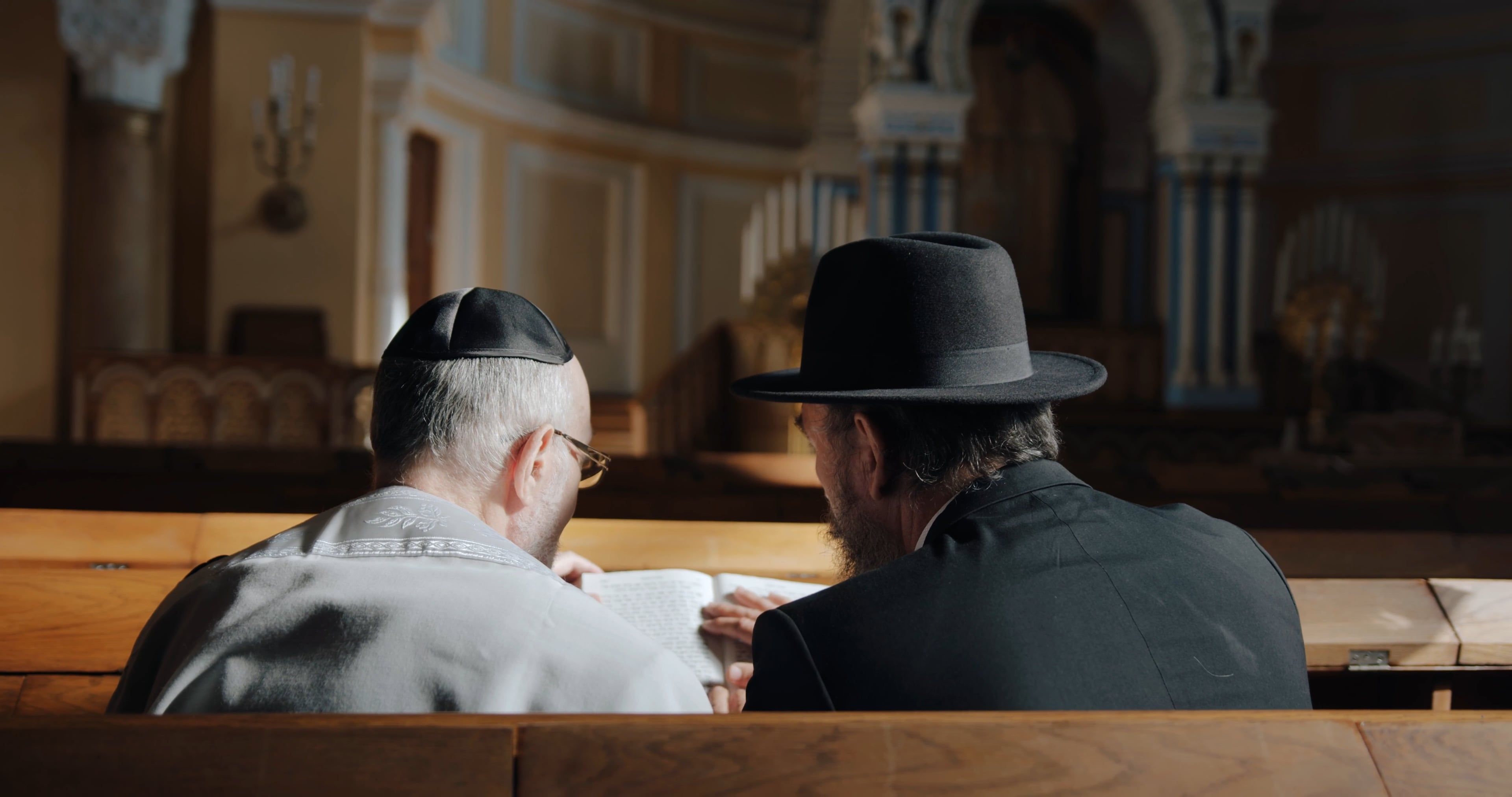 Back View of Men Sitting and Talking in Synagogue Free Stock Video ...