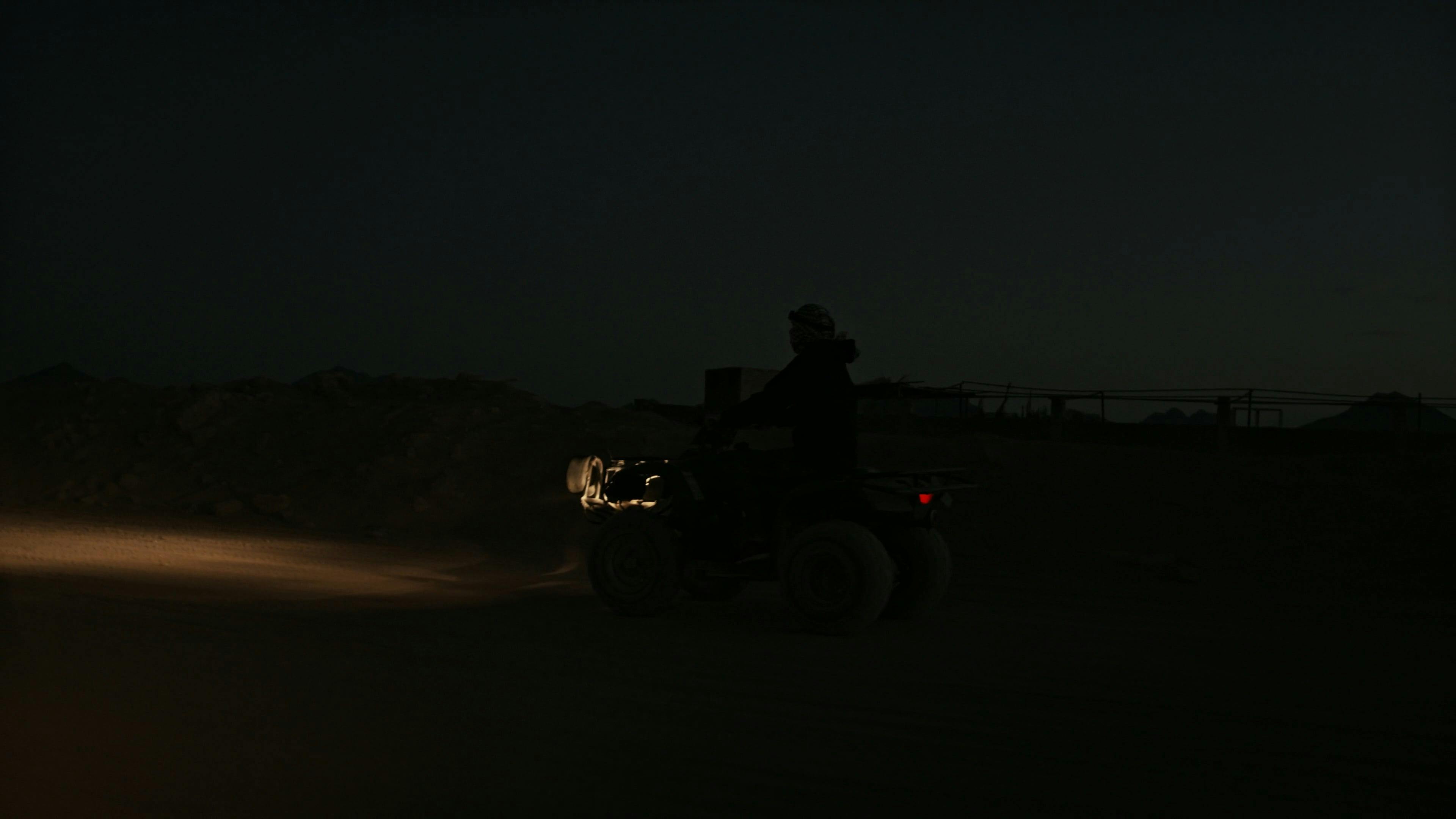 A Person Riding a Quad Bike During Nighttime Free Stock Video Footage ...
