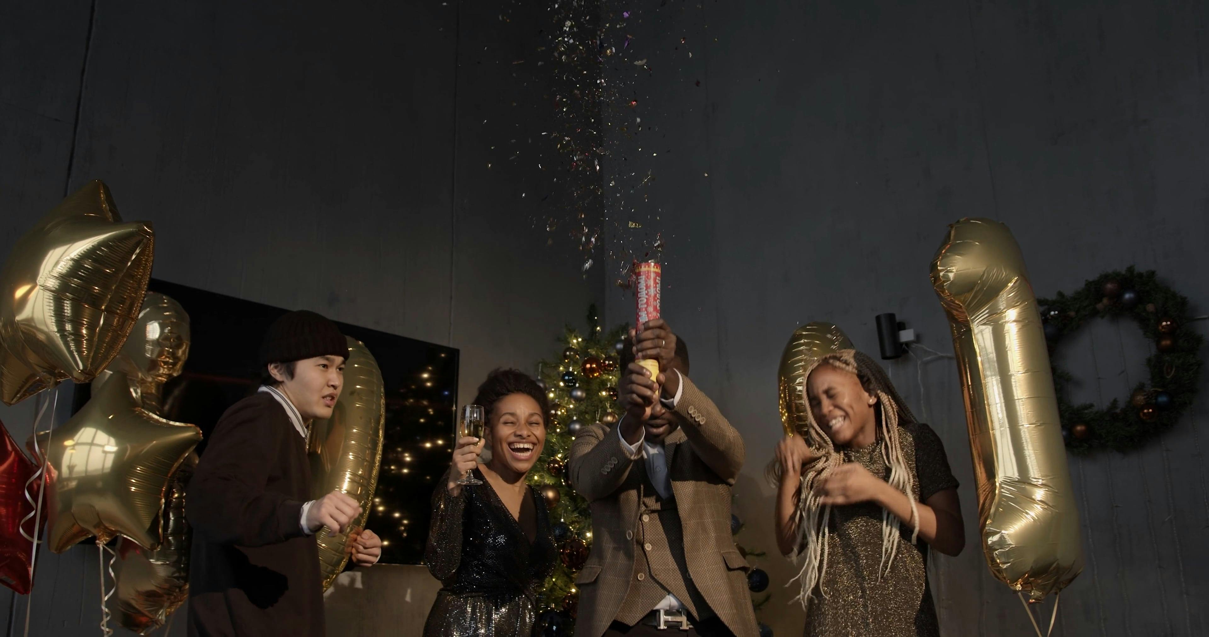 Group of Friends Having Fun Popping a Party Popper Free Stock Video ...