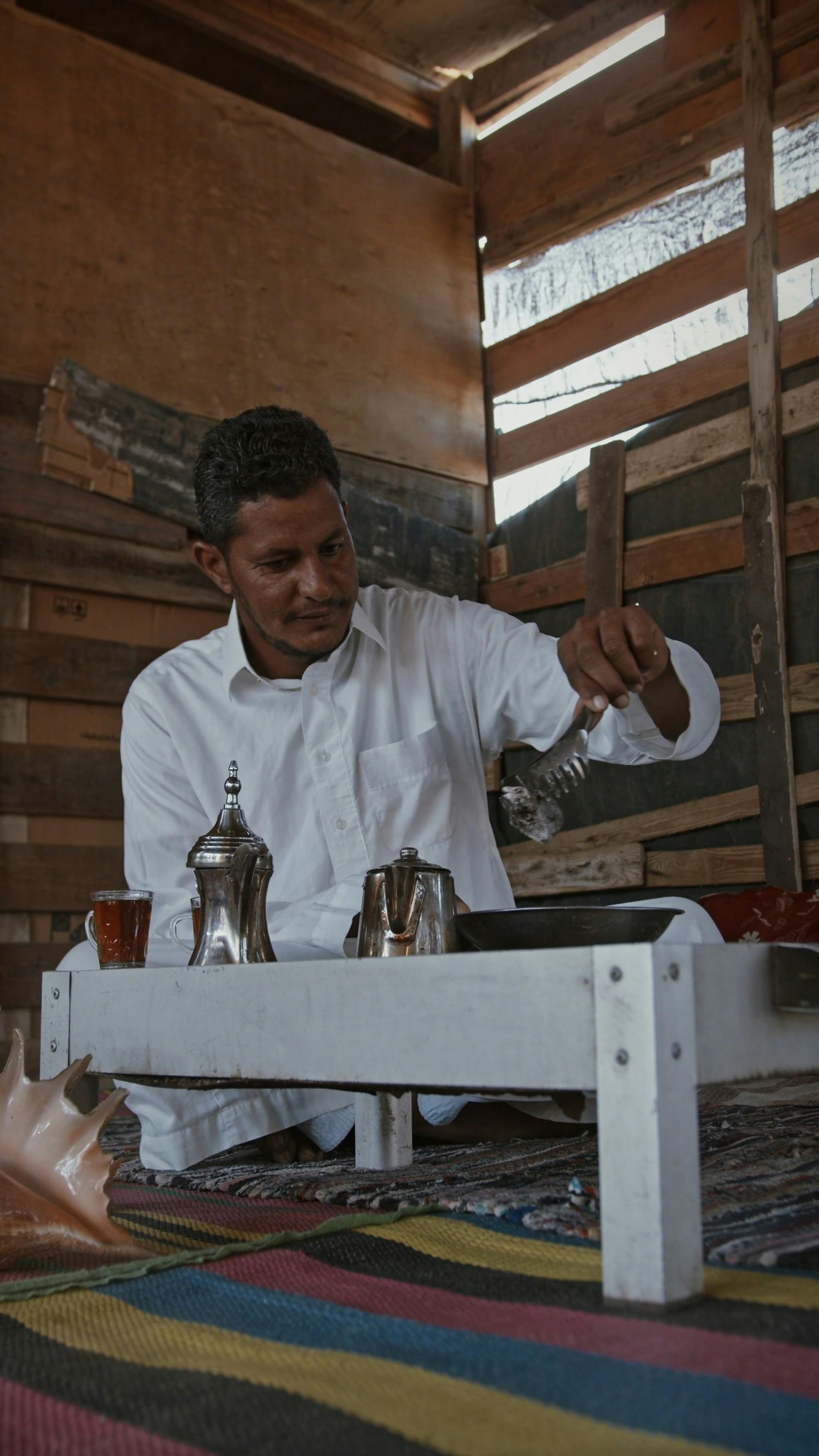 Heating Tea From A Charcoal Flame · Free Stock Video