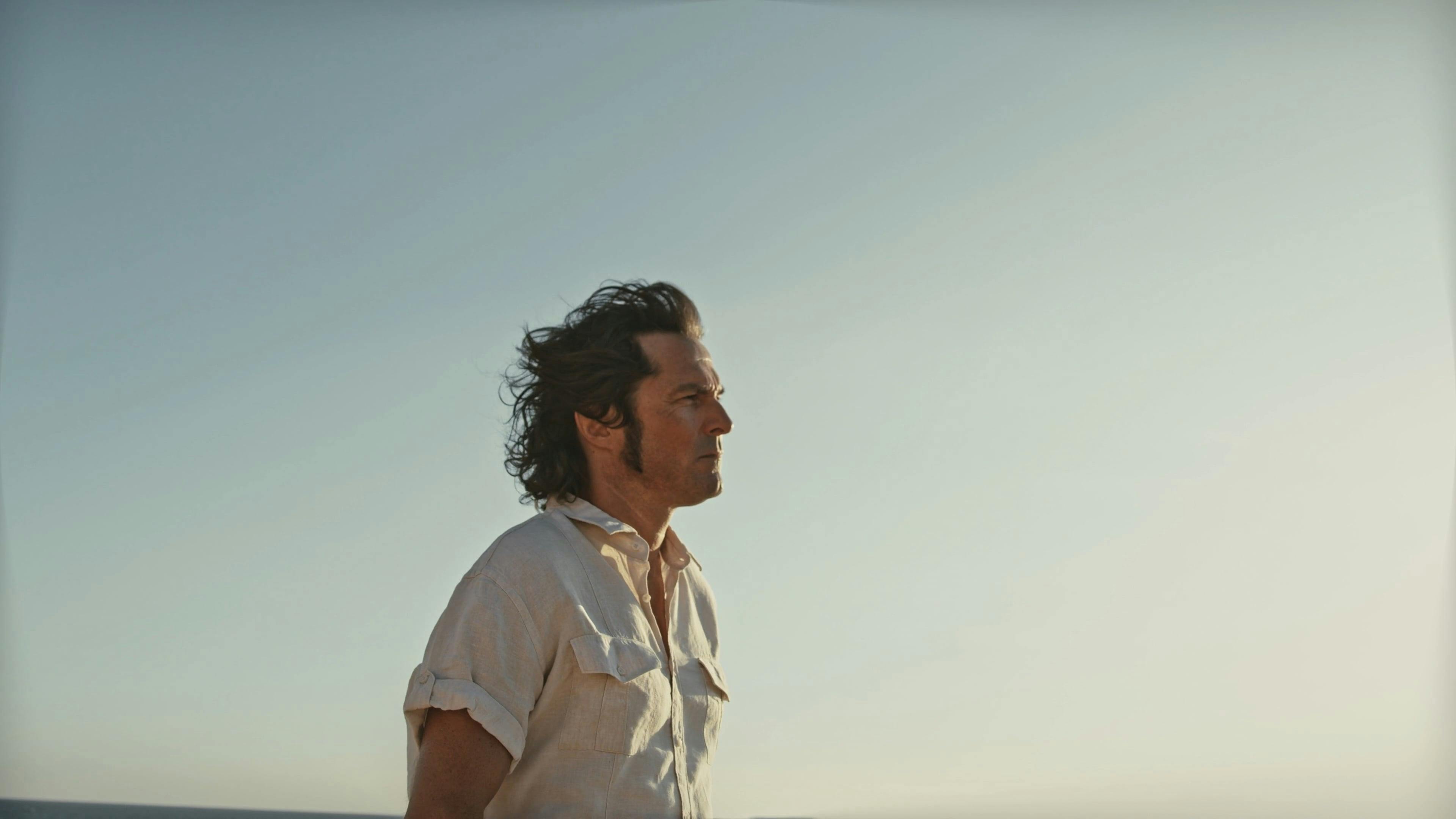 A Man Standing In The Wind Outdoors · Free Stock Video