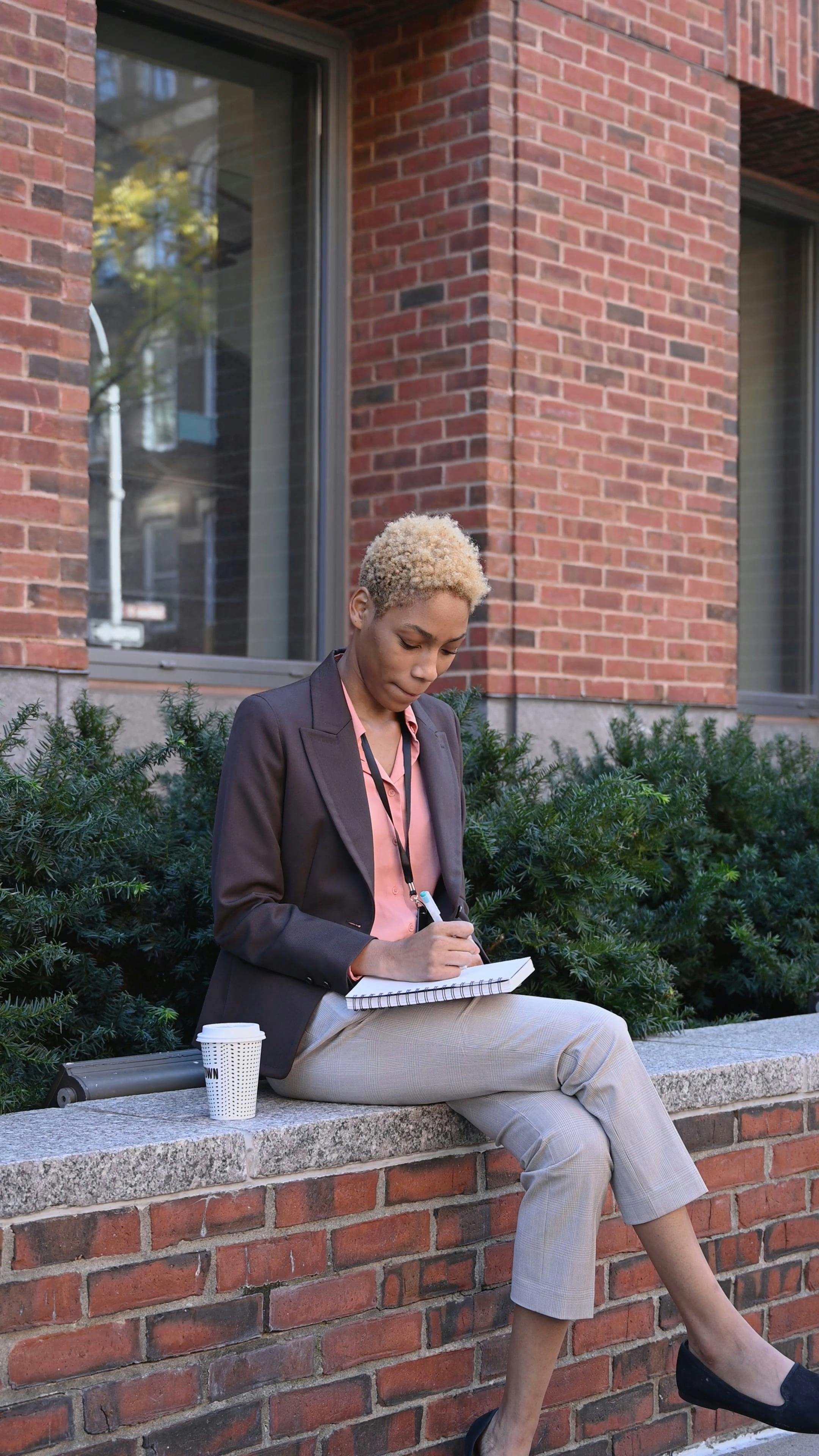 A Woman Taking Notes · Free Stock Video