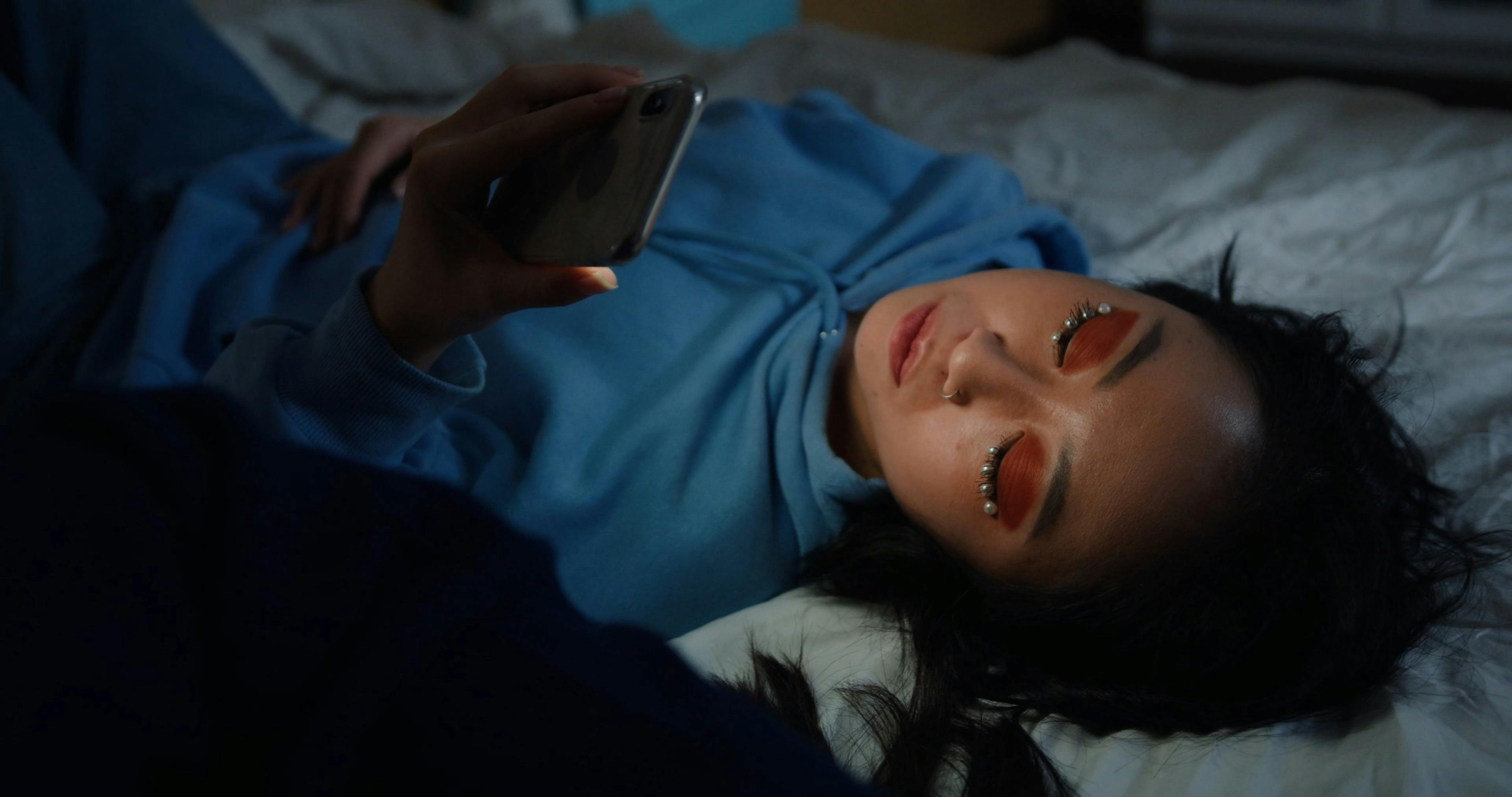 Women Using Their Smartphone while Lying Down · Free Stock Video