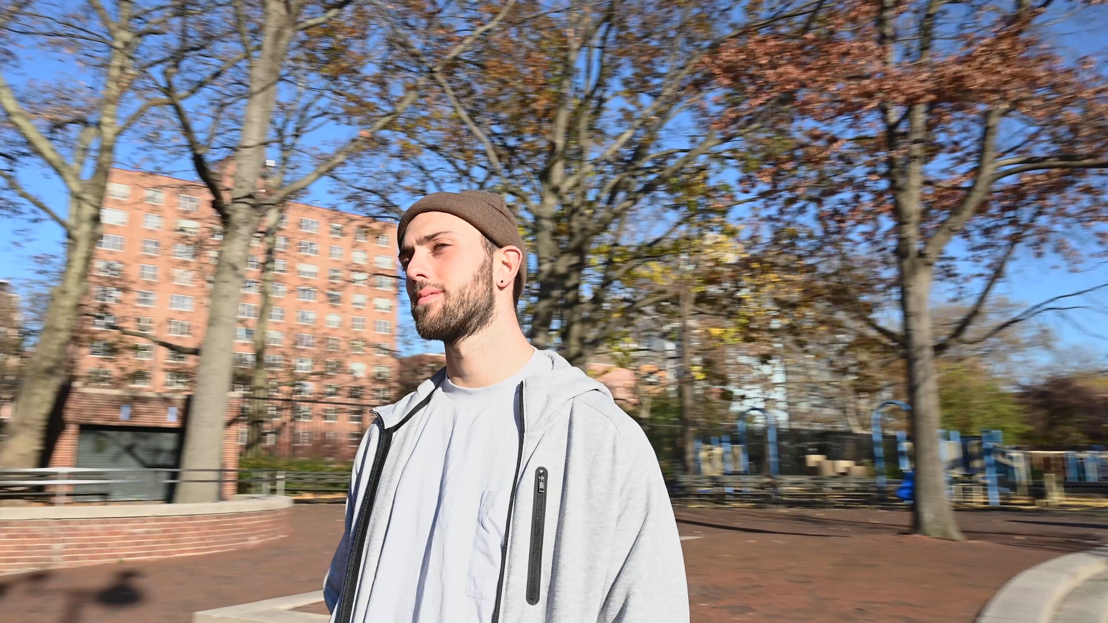 Rotating Shot of Man Standing in the Park Free Stock Video Footage ...