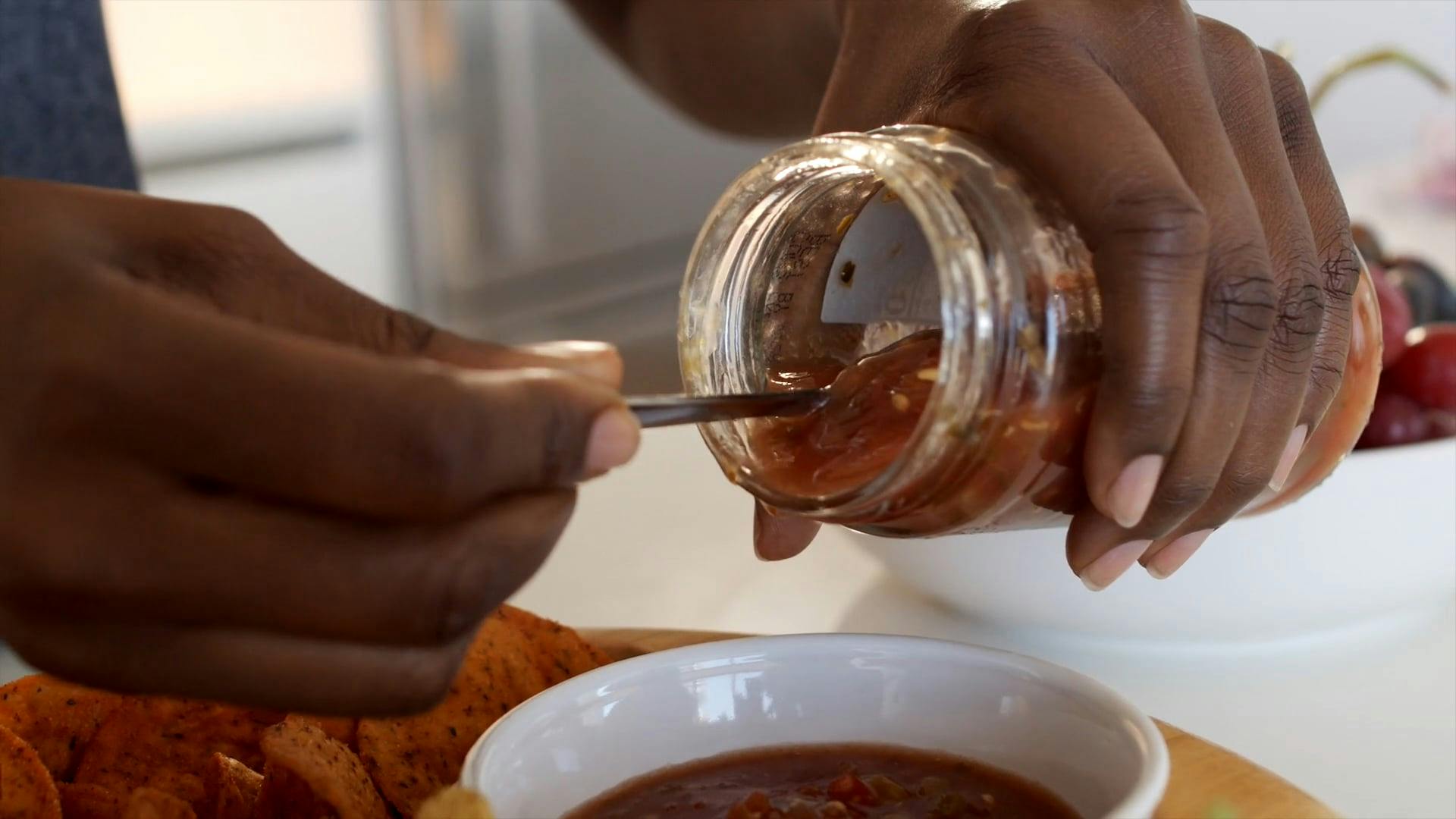 A Person Putting Salsa on a Bowl Free Stock Video Footage, Royalty-Free ...