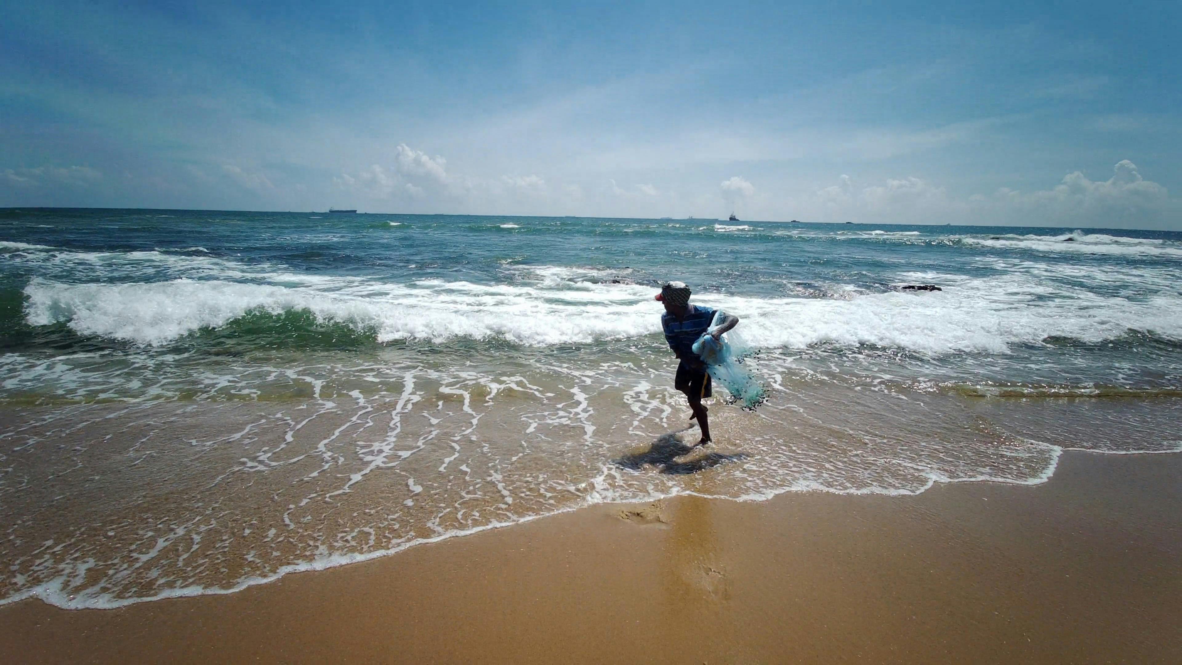 A Man Throwing Fish Net on the Pond · Free Stock Video