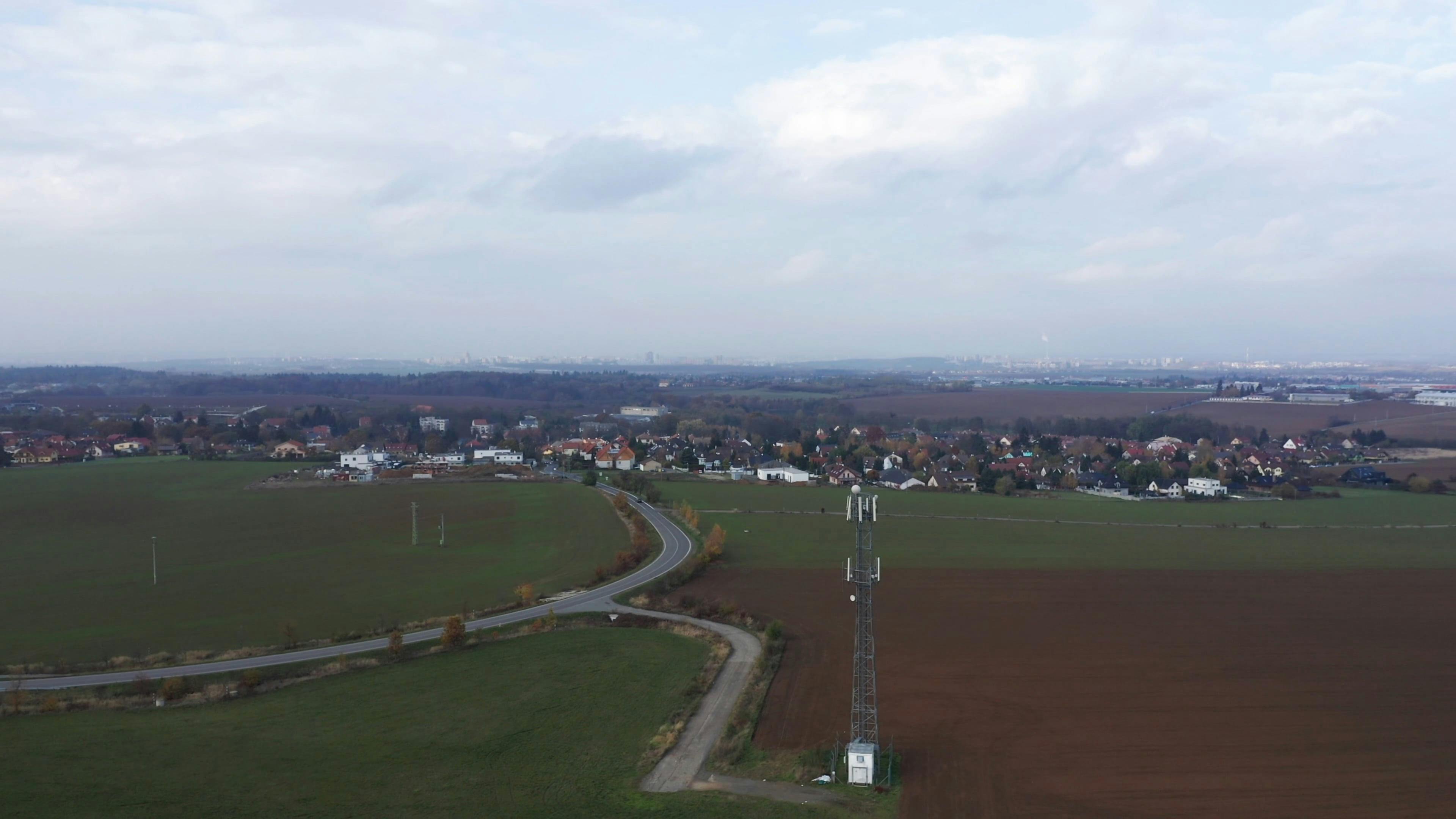 Aerial Footage of an Open Field by the City Free Stock Video Footage ...