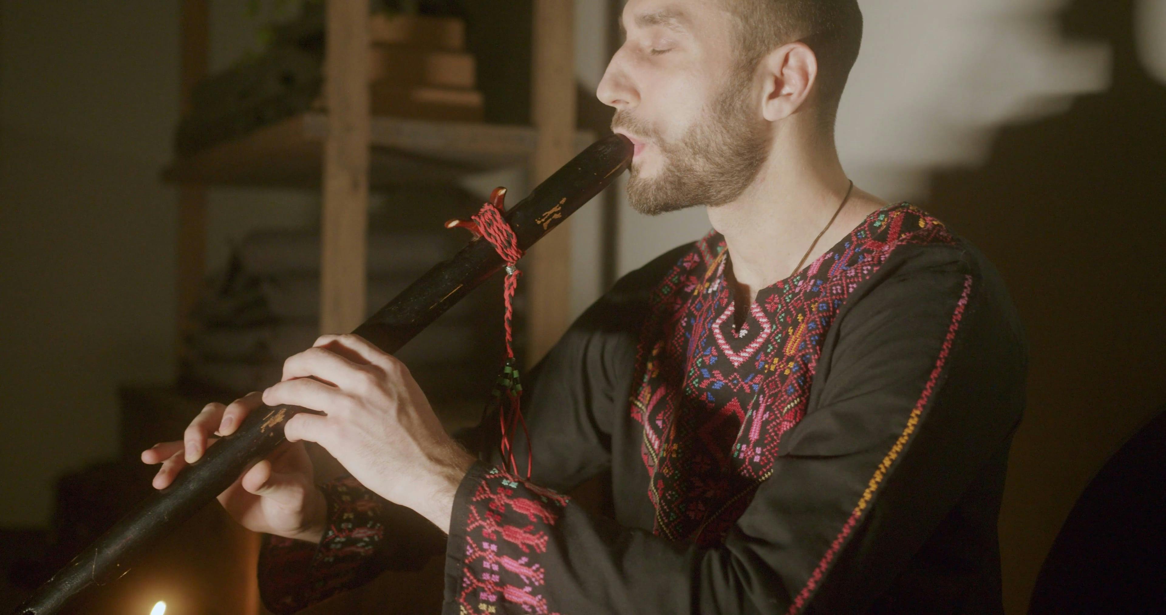 A Man Playing A Traditional Flute · Free Stock Video