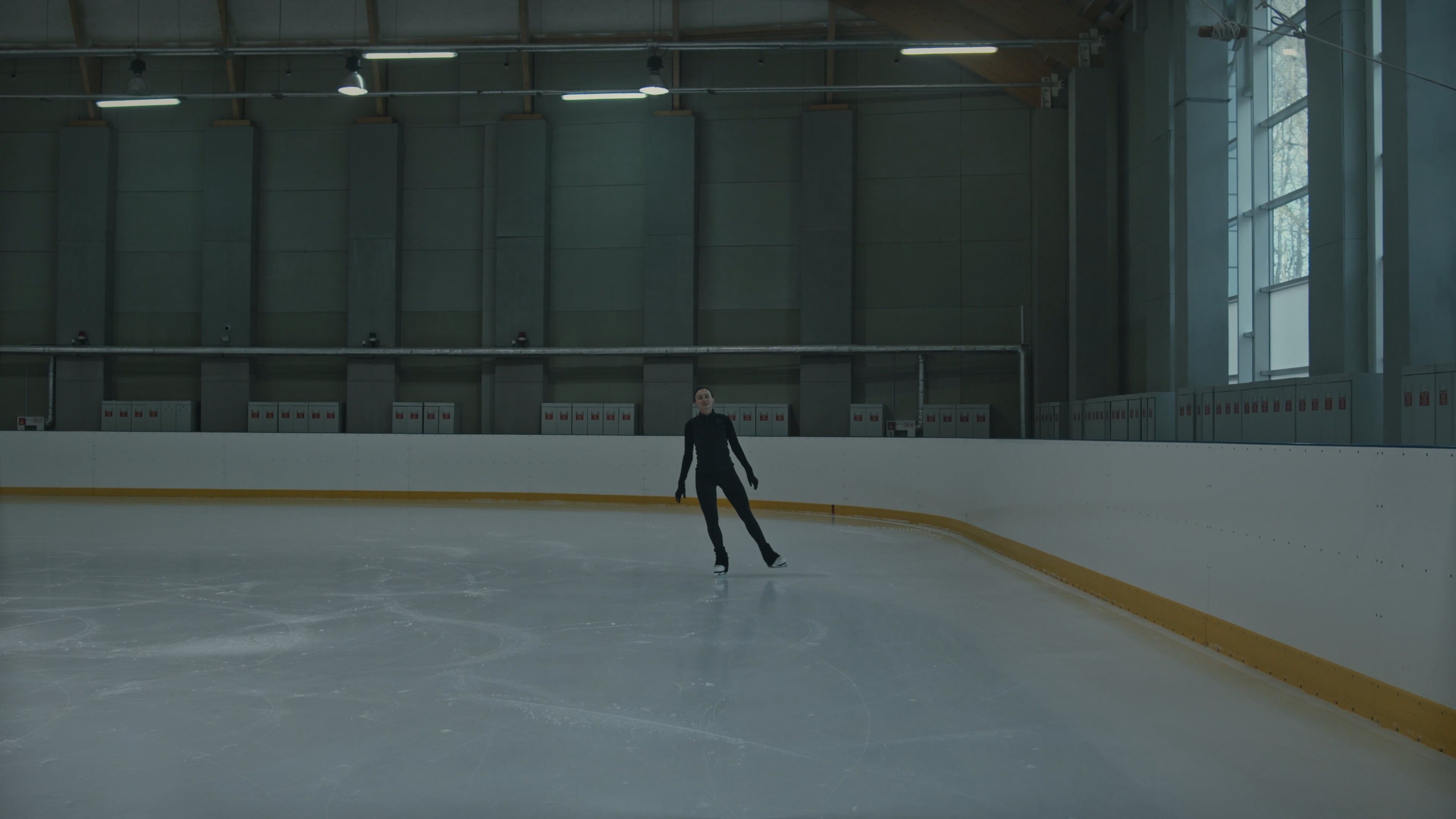 A Woman Gliding on an Ice Skating Rink Free Stock Video Footage ...